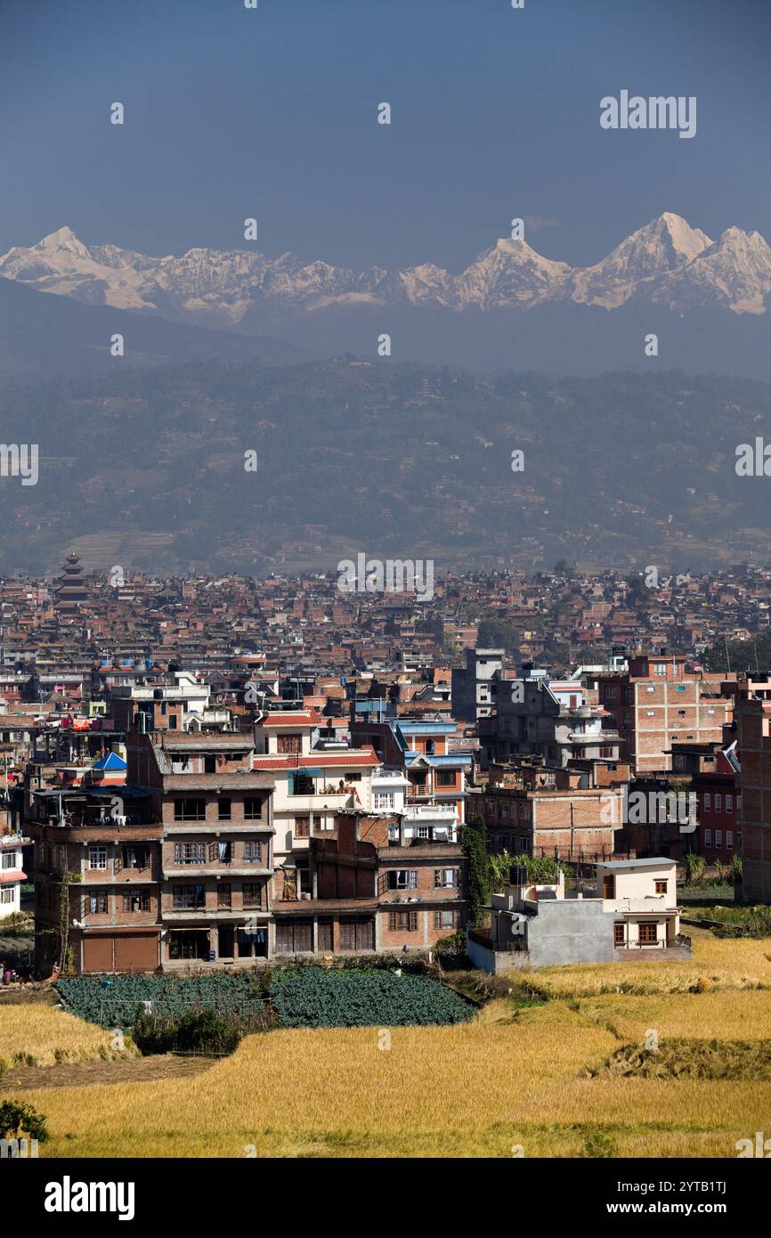 Cityscape skyline of Kathmandu with the Himalaya snow capped mountains ...