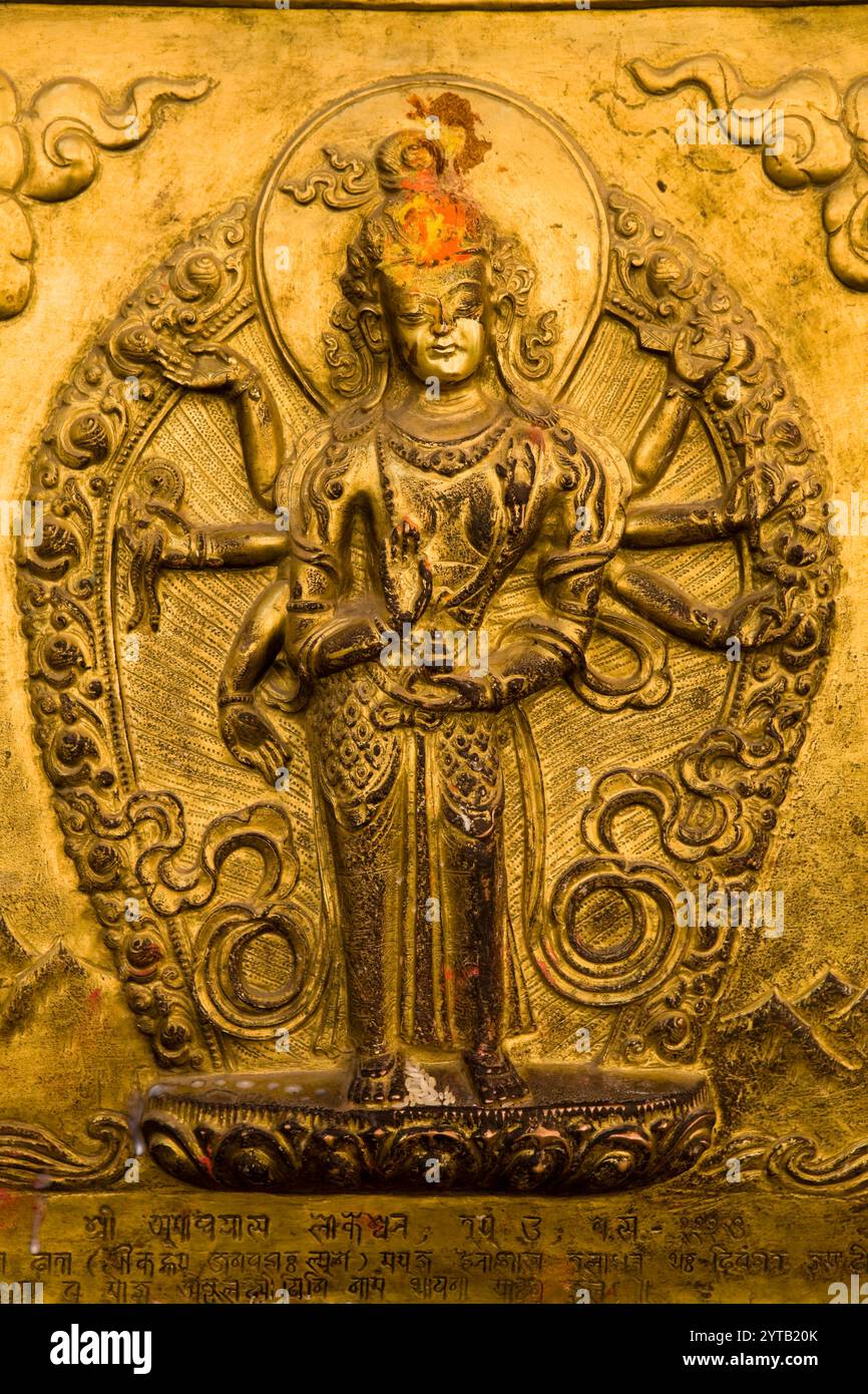 Golden ornate wall detail at Seto Machindranath Temple, also known as ...