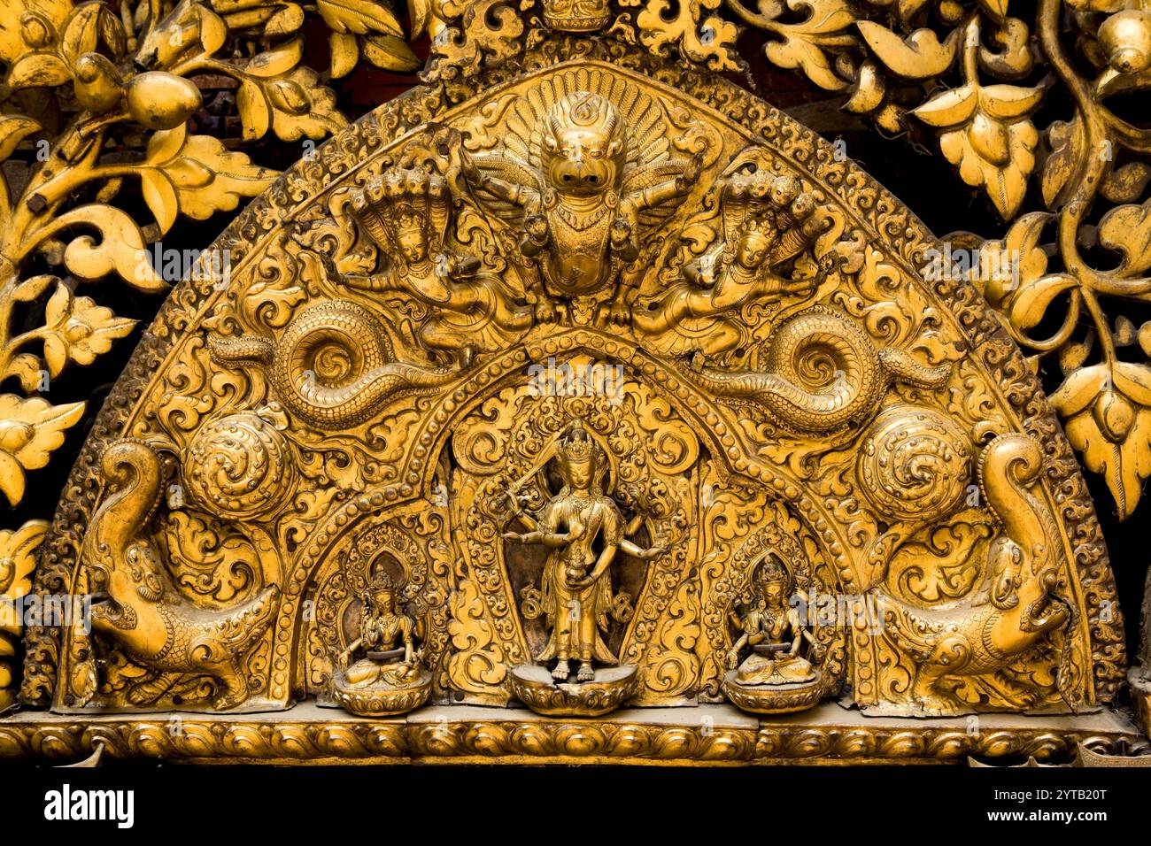 Golden ornate wall detail at Seto Machindranath Temple, also known as ...