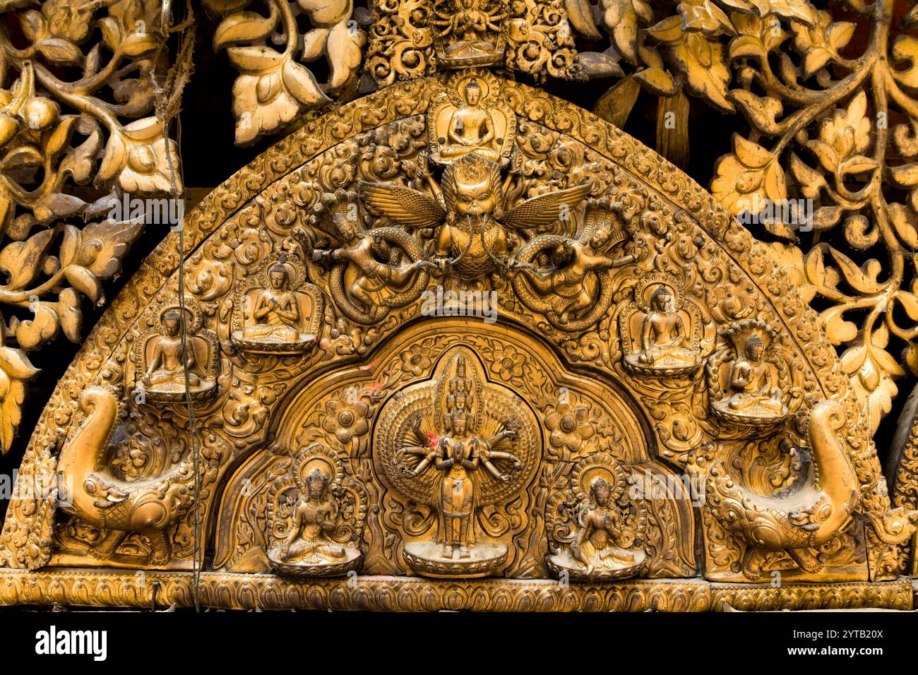 Golden ornate wall detail at Seto Machindranath Temple, also known as ...