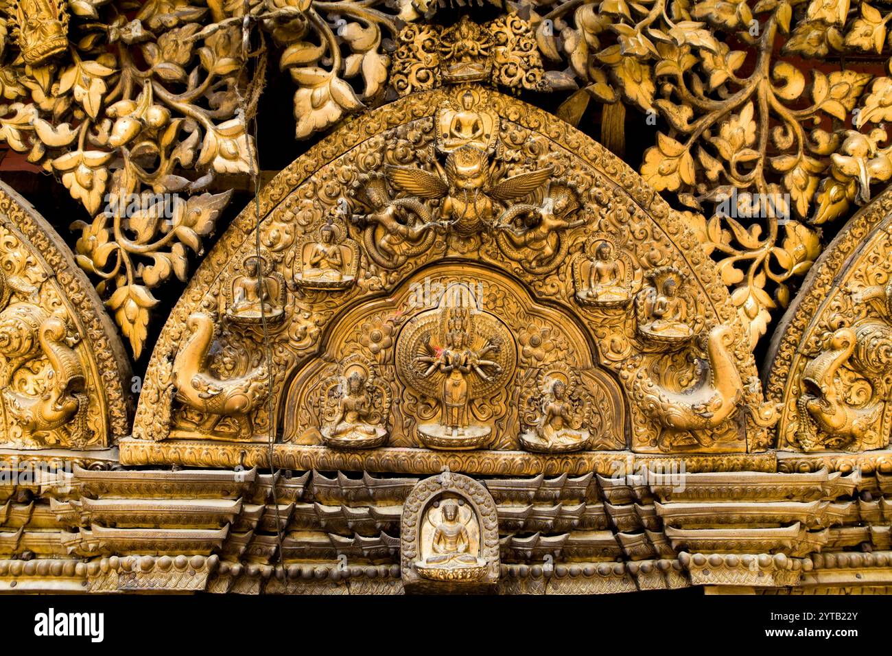 Golden ornate wall detail at Seto Machindranath Temple, also known as ...