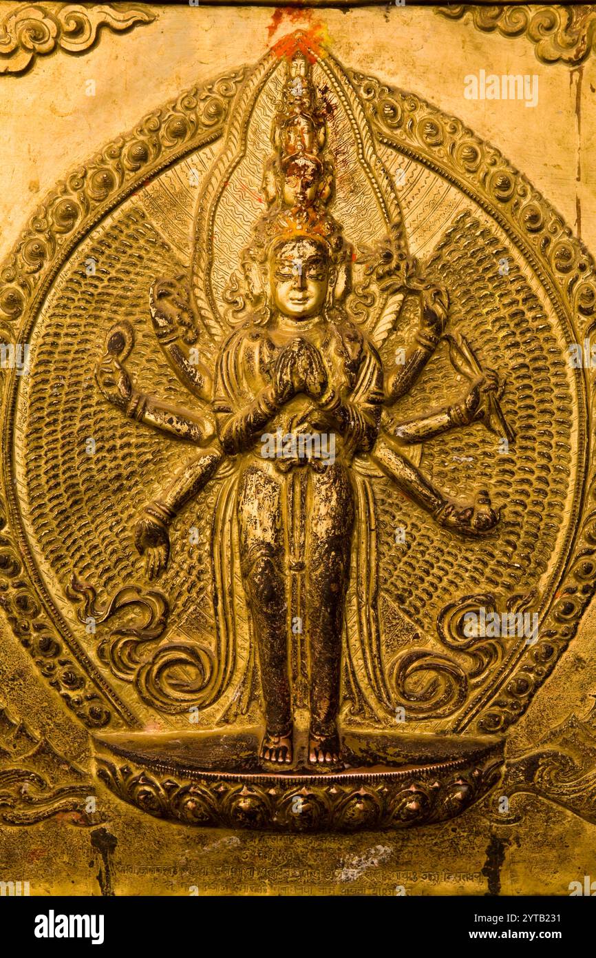 Golden ornate wall detail at Seto Machindranath Temple, also known as ...