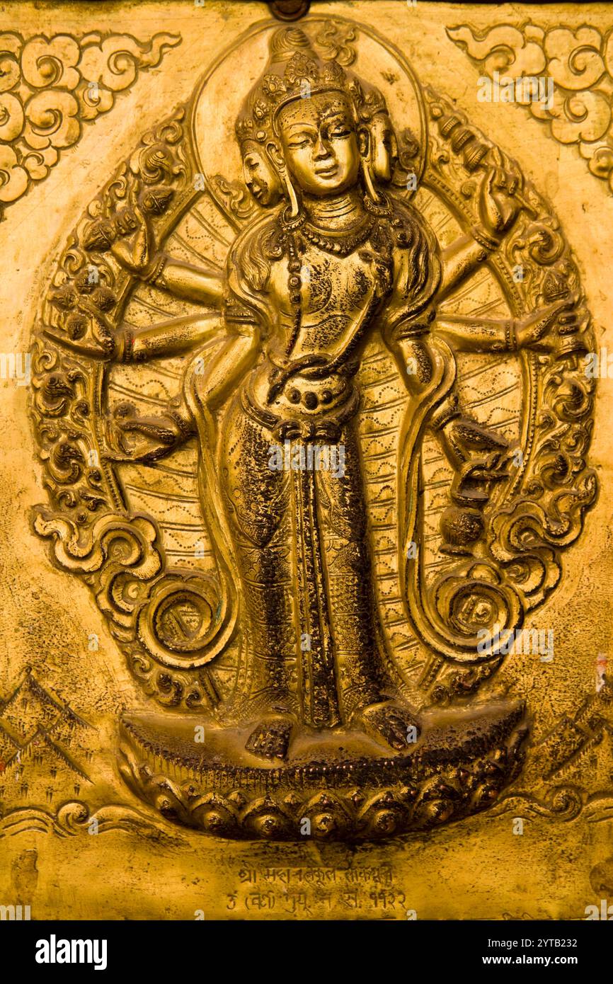 Golden ornate wall detail at Seto Machindranath Temple, also known as ...