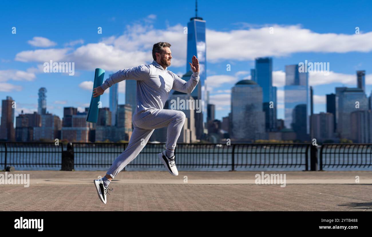 Morning sport workout runner running in NY. Sportsman man running ...