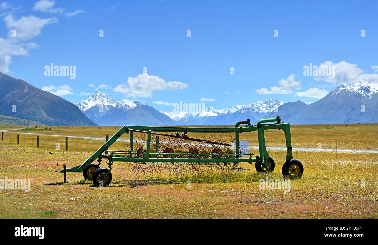 Historic green metal Farm Rake on Mesopotamia Station with the Southern ...