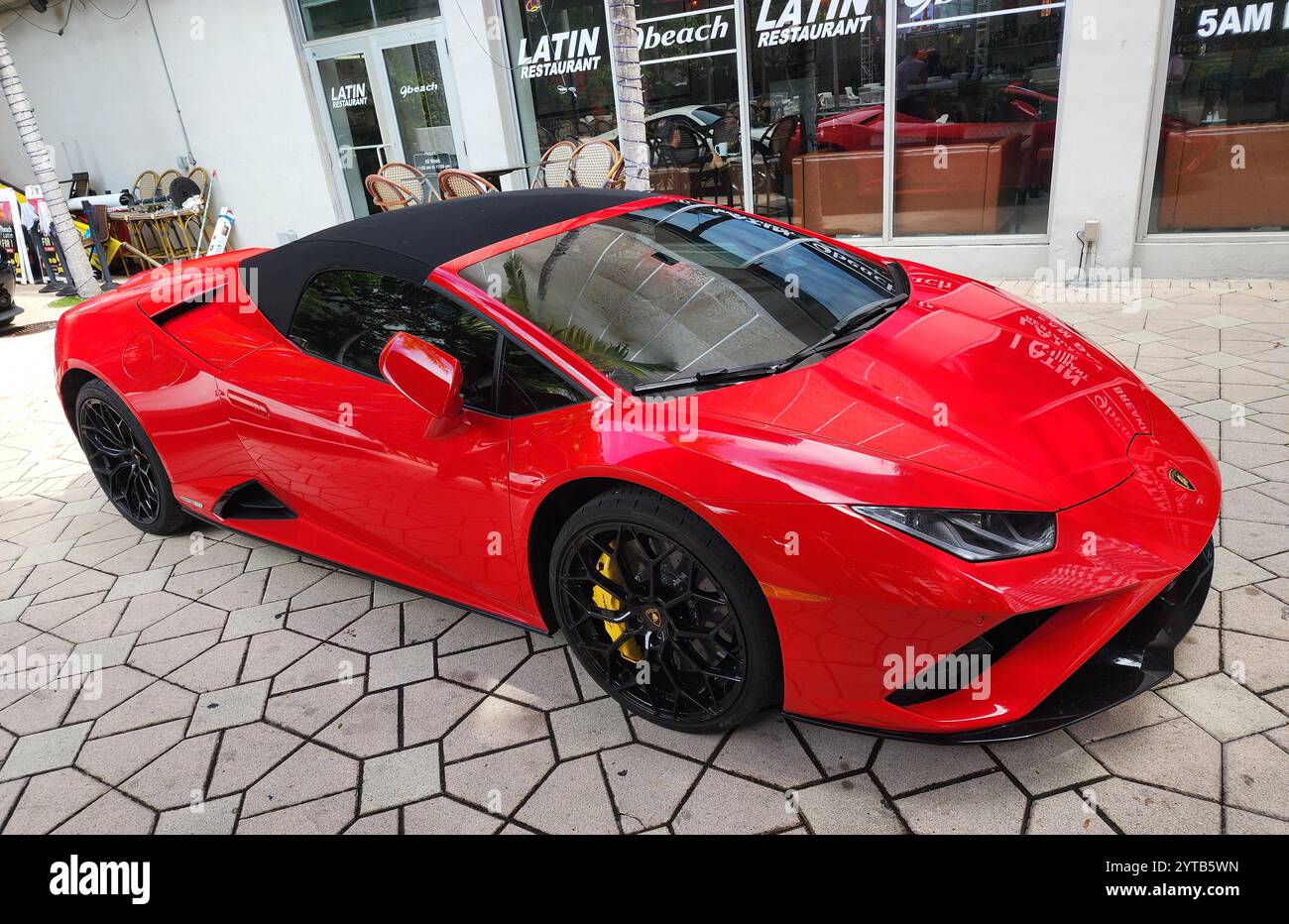 Miami Beach, Florida USA - June 8, 2024: Lamborghini Huracan red at Miami beach. Lamborghini is ...