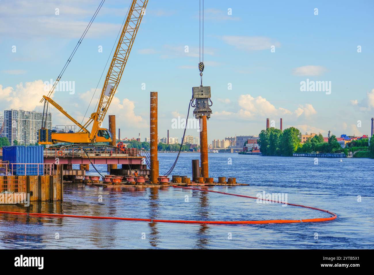 Crane building bridge. Installation pile support. Installation using ...