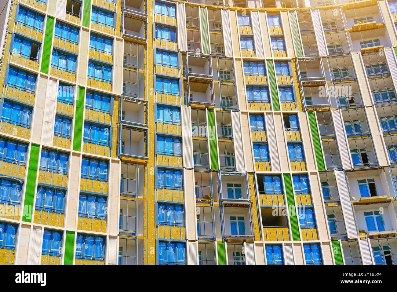 Cladding and warming wall of monolithic house under construction ...