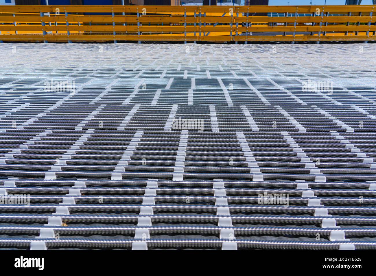 Floor surface with pipes and tubes for skating rink temperature and ...