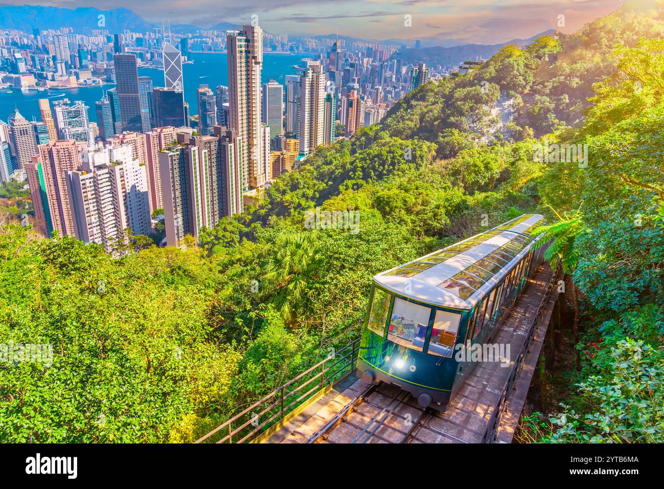 The famous green tram on the slope of Victoria Peak in metropolis Hong ...