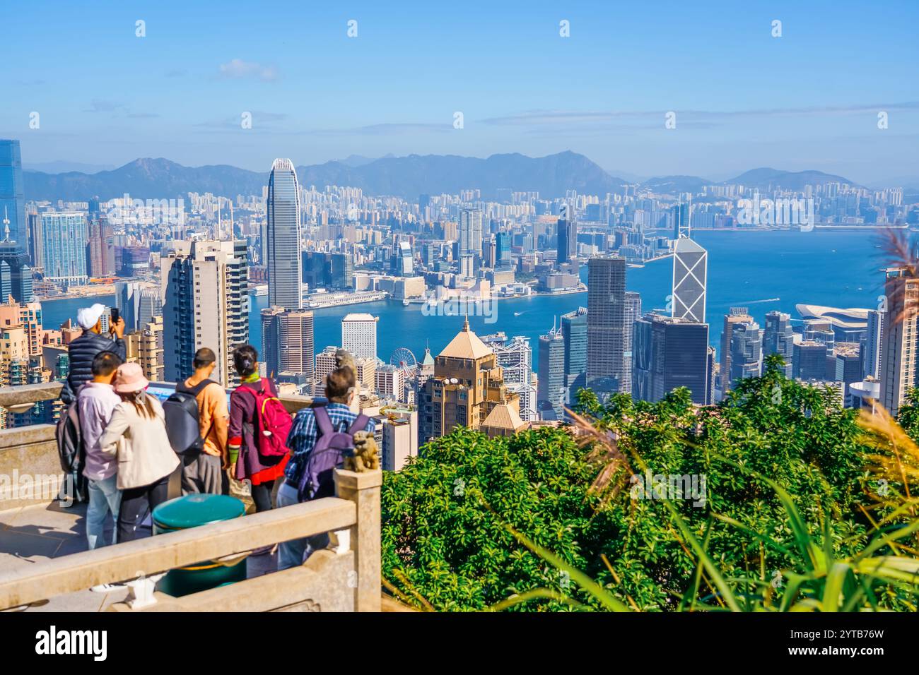 Panoramic of Hong Kong city view from Victoria Peak with a crowd of ...