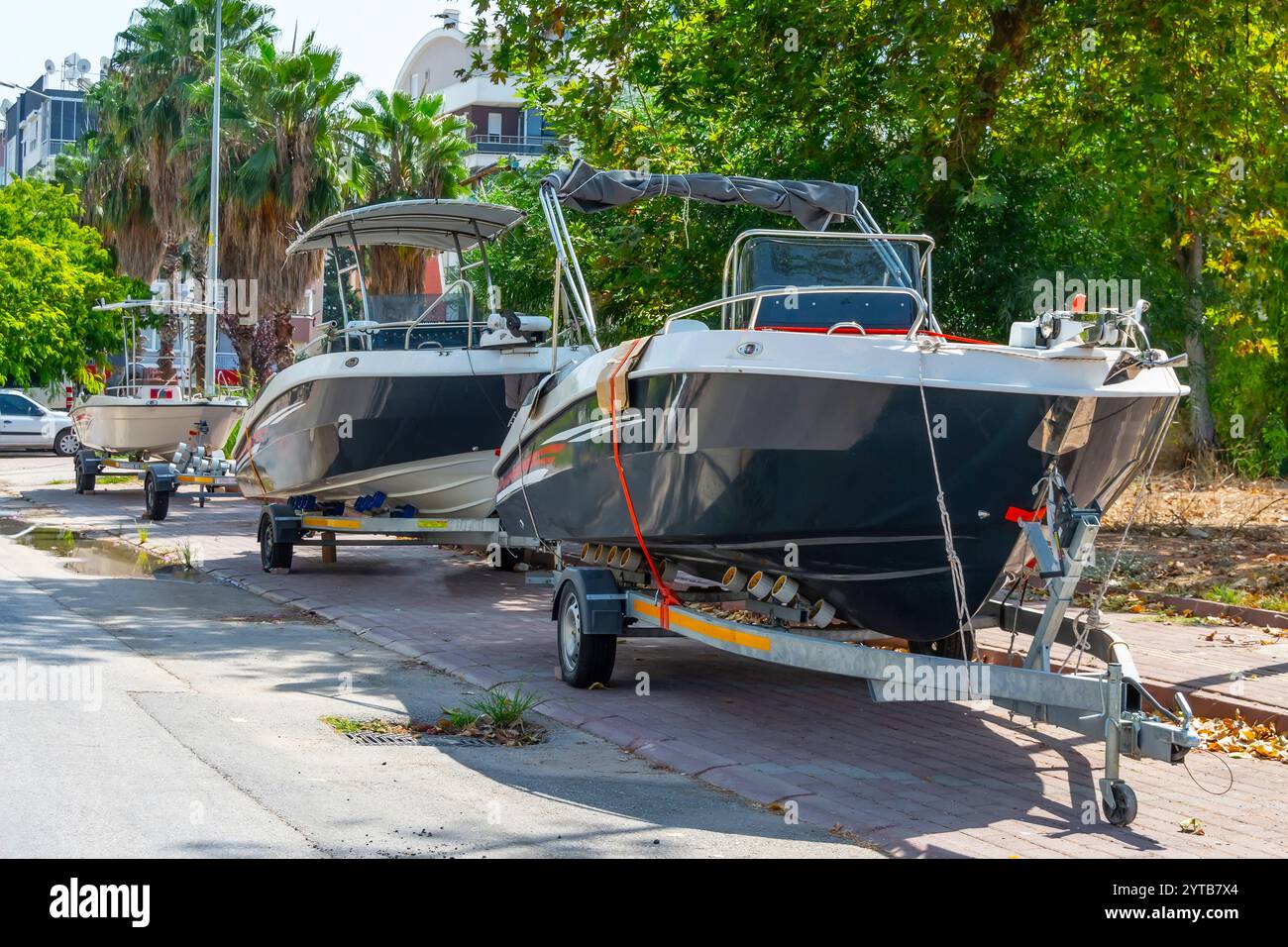 High-speed fishing boat is tied and loaded onto a trailer for ...