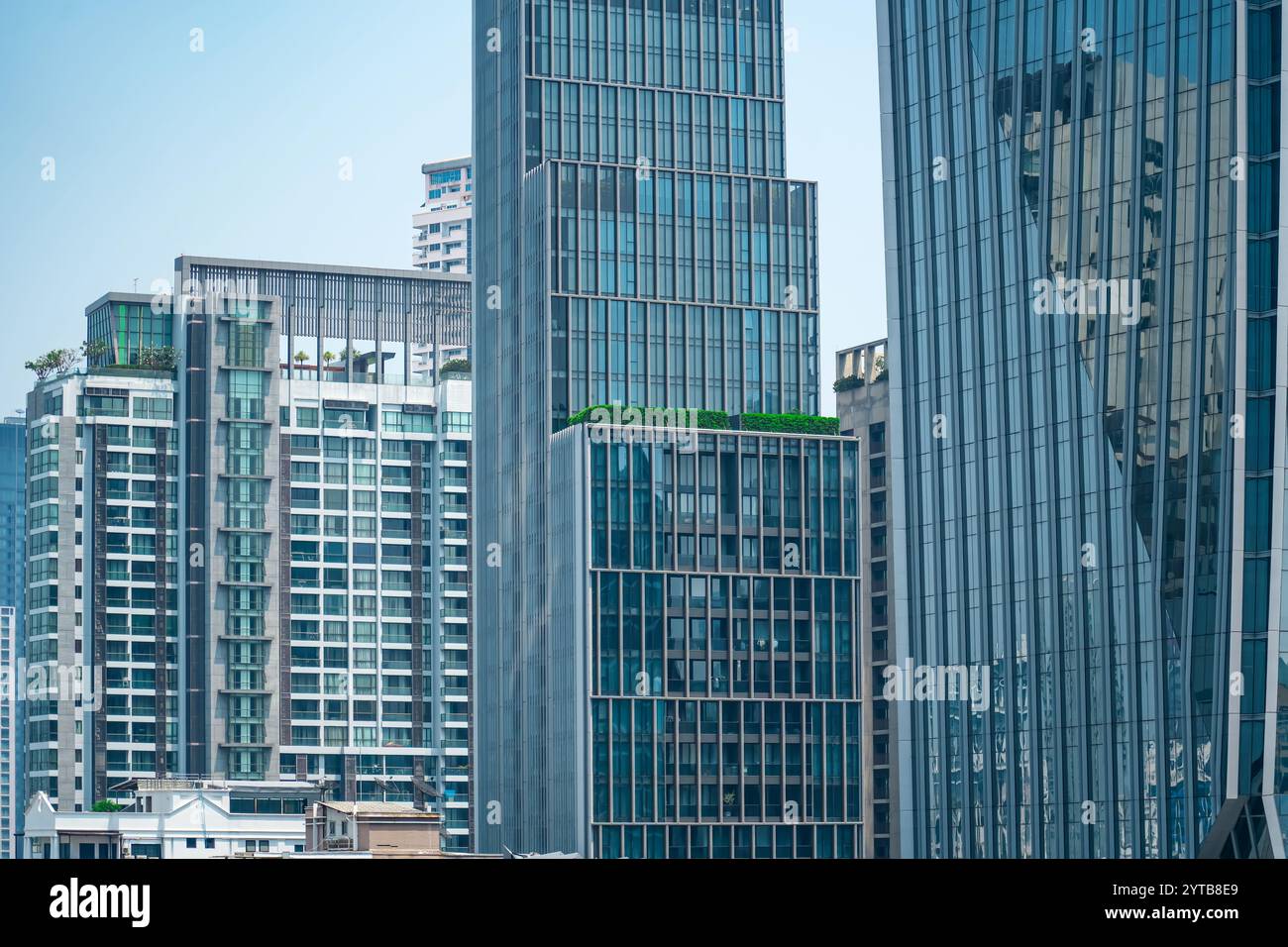 Powerful buildings, skyscrapers with greenery on the roofs, modern look ...