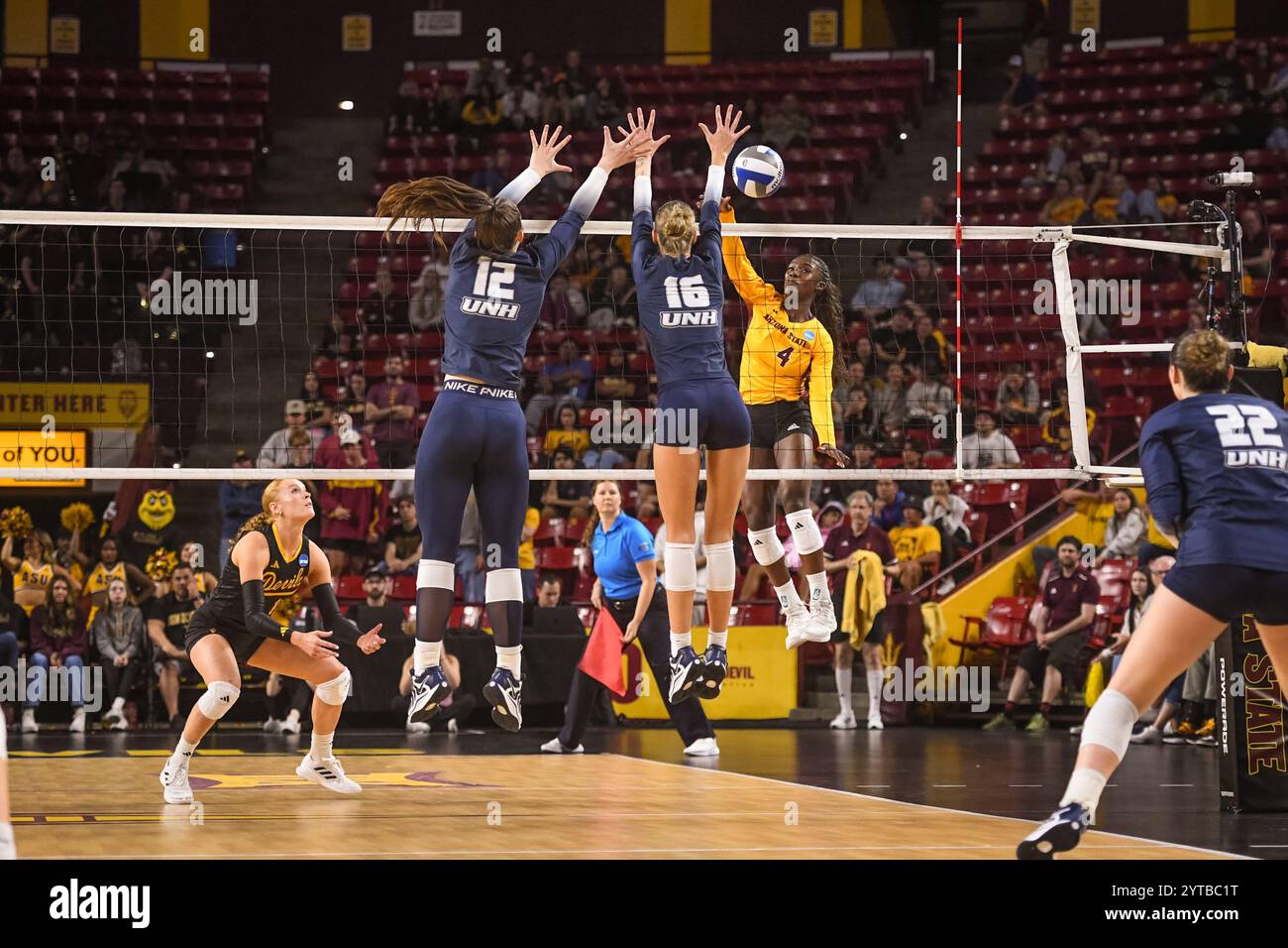 Arizona St. outside hitter Shania Cromartie (4) spikes the ball in the ...