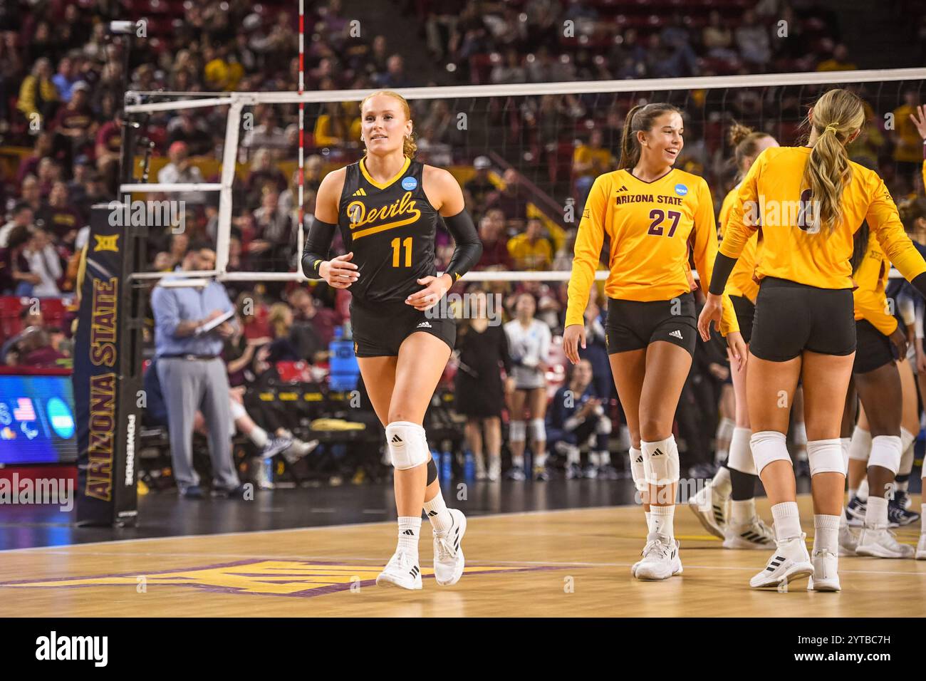 Arizona St. libero Mary Shroll (11) prepares to serve in the second set ...