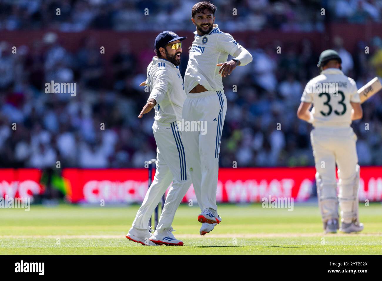 ADELAIDE, AUSTRALIA - DECEMBER 07: Nitish Kumar Reddy and Rohit Sharma ...