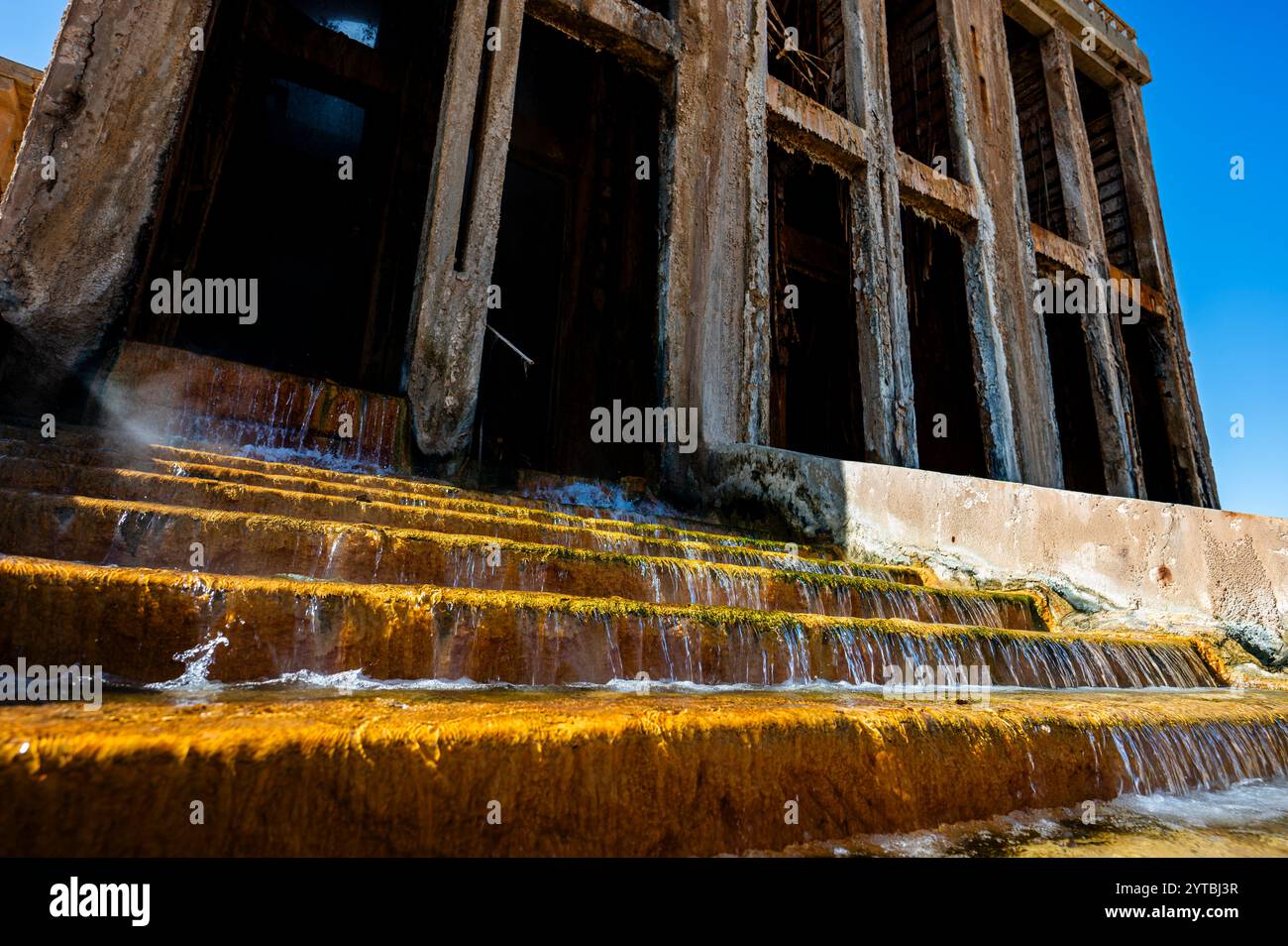 Abandoned hot water well near the Zaouia oasis in the Sahara Desert in ...