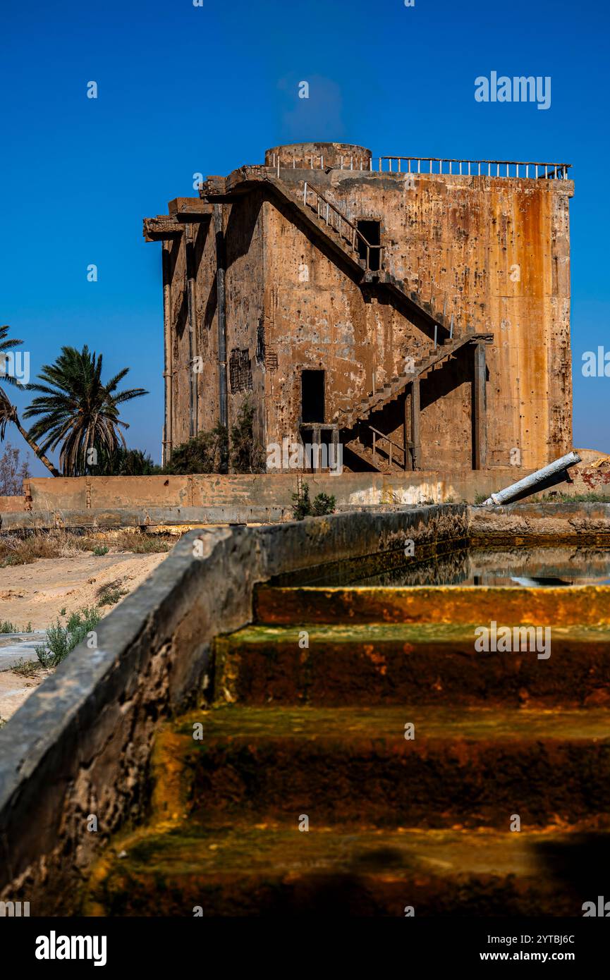 Abandoned hot water well near the Zaouia oasis in the Sahara Desert in ...