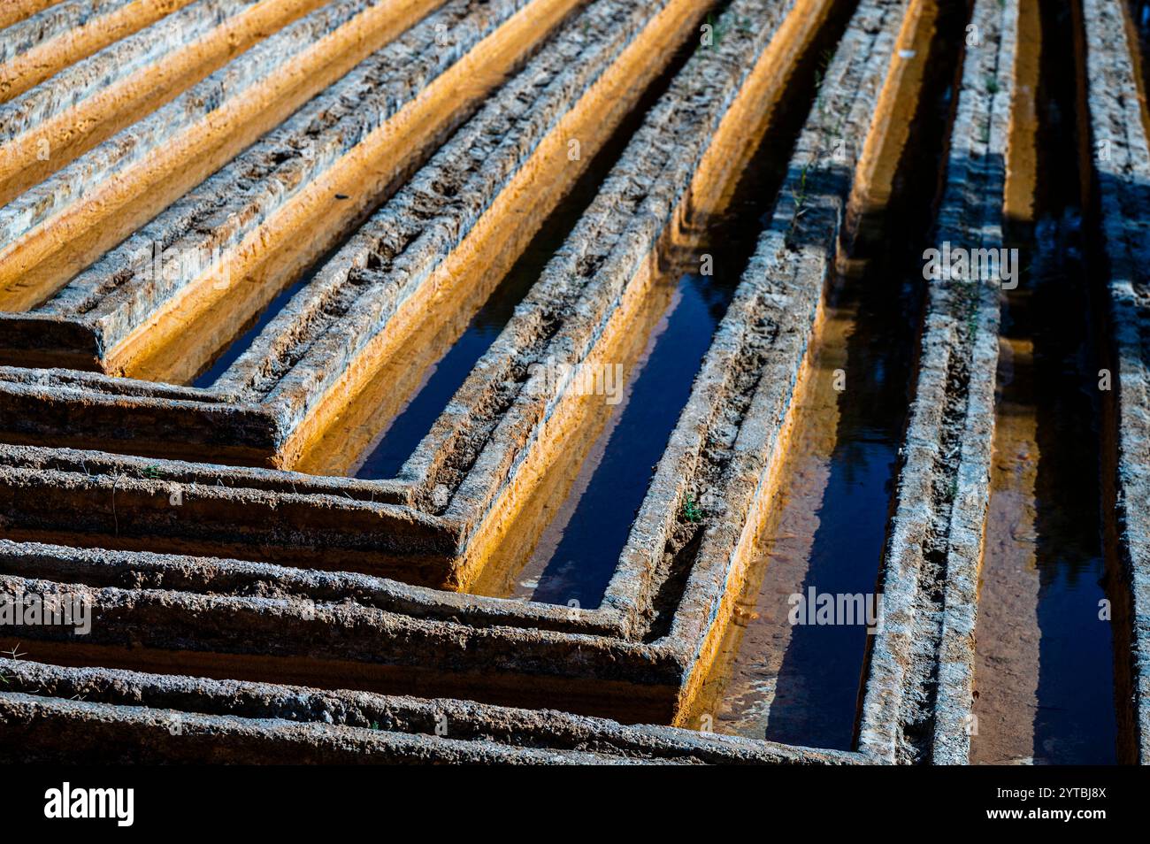 Abandoned hot water well near the Zaouia oasis in the Sahara Desert in ...
