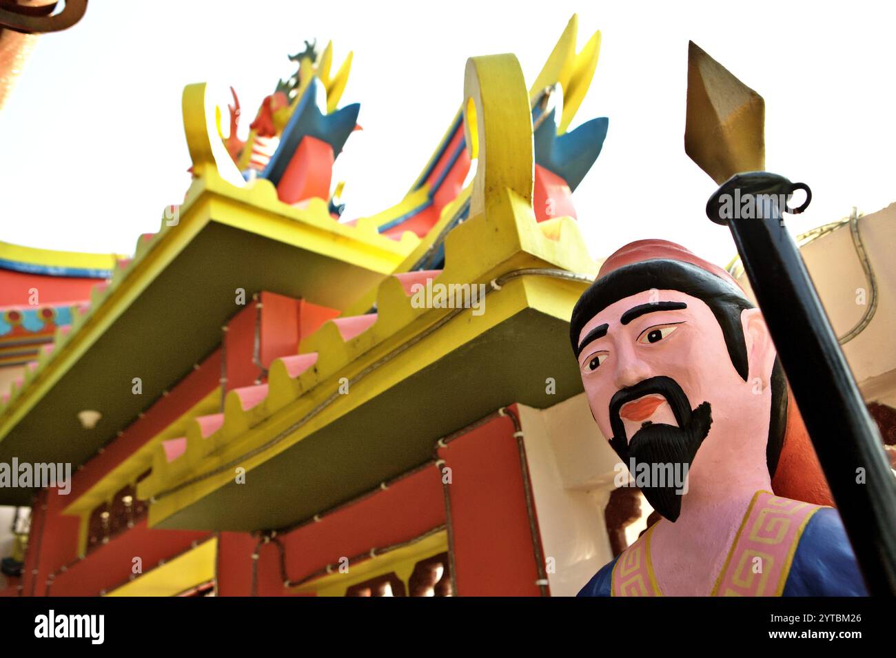 Sculpture of a guardian figure at Pulo Kemaro temple complex—a worship ...