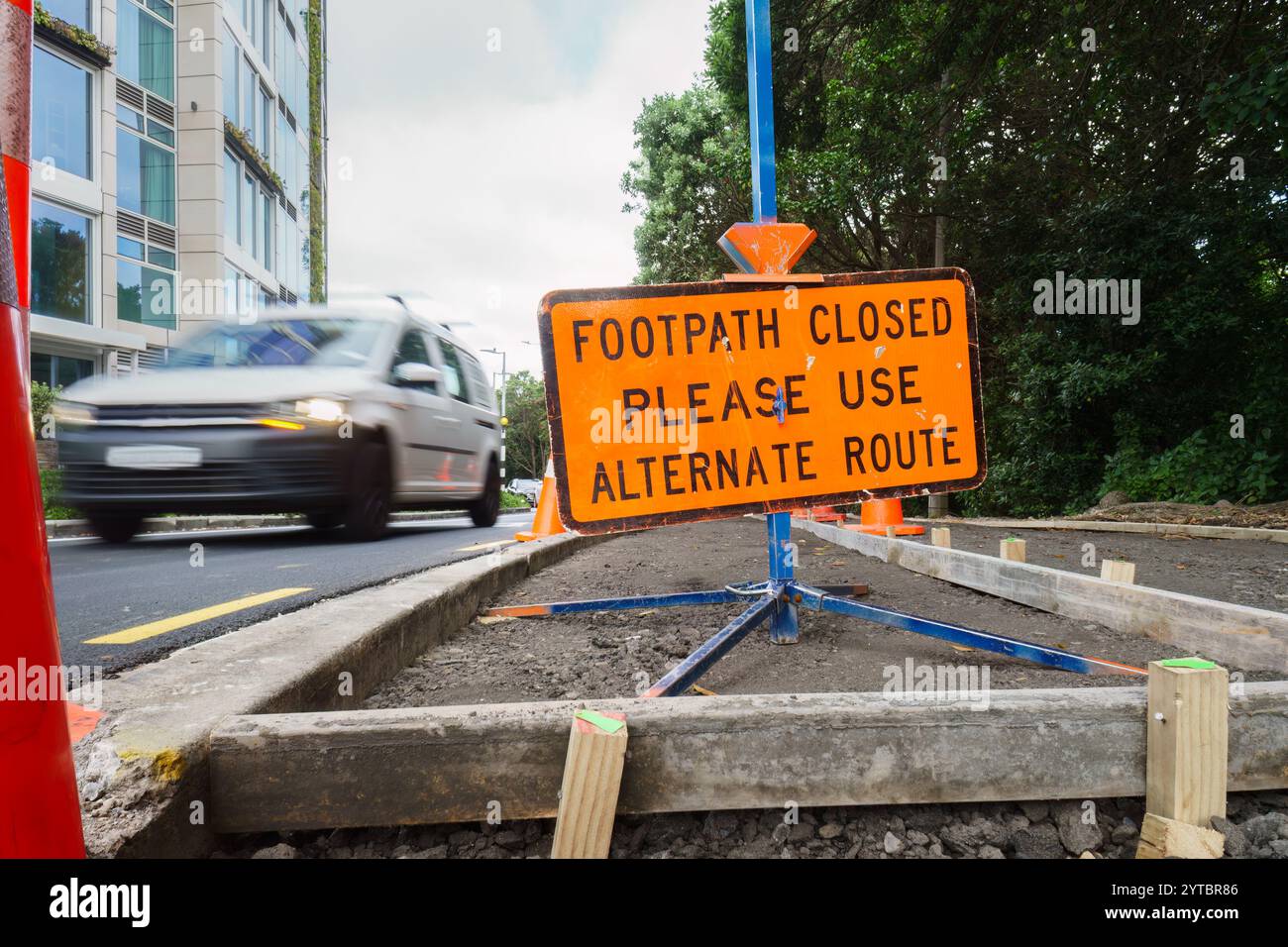 Footpath under repair. Footpath Closed road sign by the road. Roadworks ...