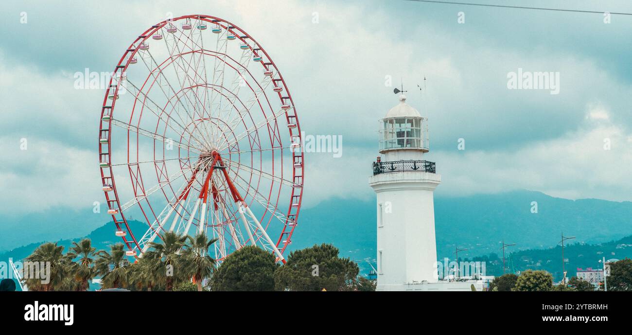 Batumi, Georgia - 13 JUNE 2024: The Ferris Wheel and the Lighthouse ...