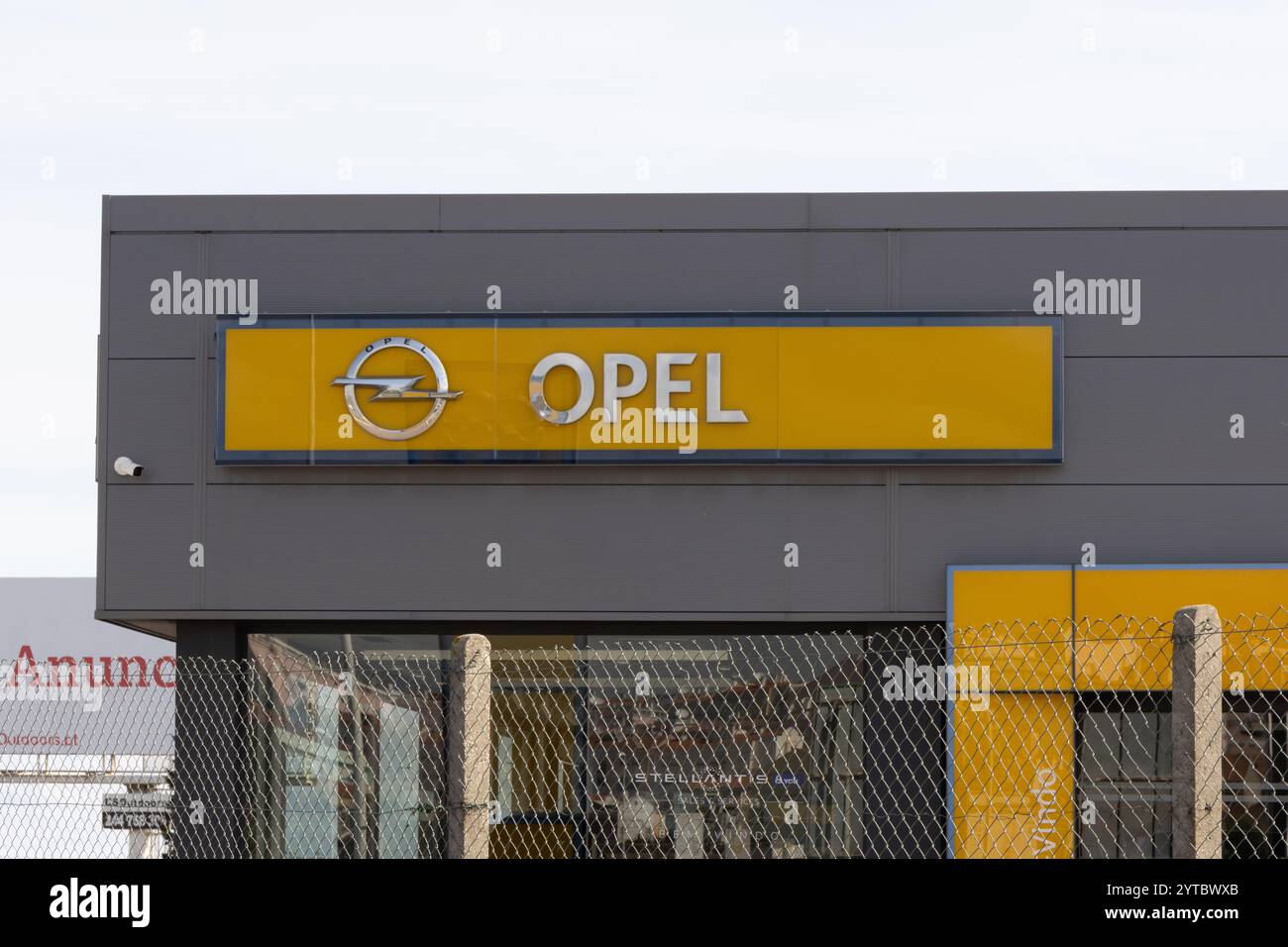 Opel logo displayed on a dealership building, representing the ...
