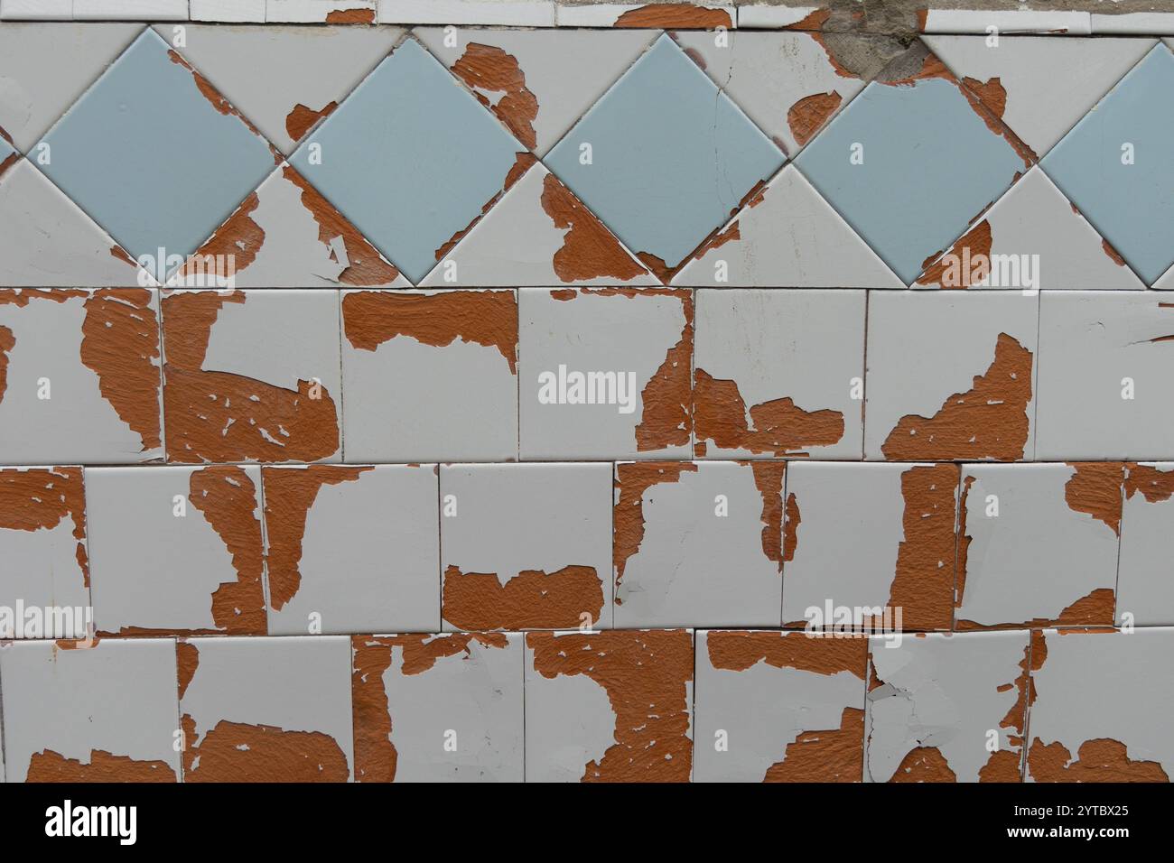 An old enamel tile wall texture. Cracked, abandoned building wall from ...