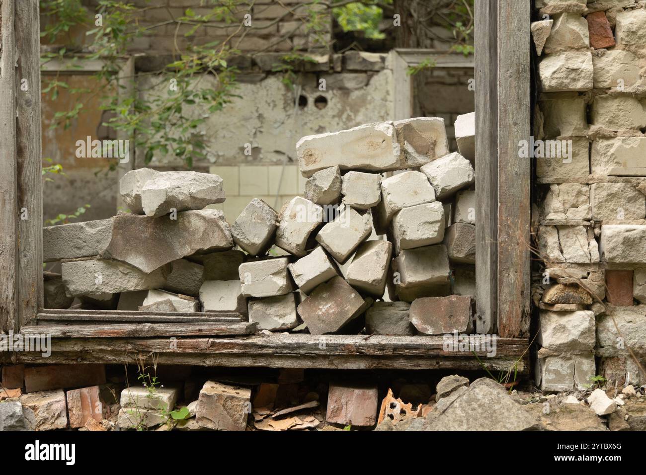 A broken, empty window of building ruins from Soviet times. Collapsed ...