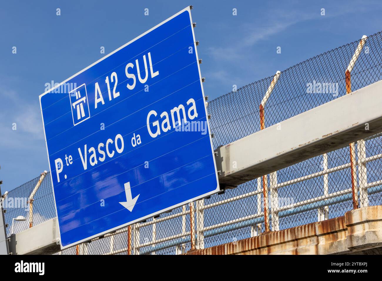 Blue road sign indicating the vasco da gama bridge and a12 sul motorway ...