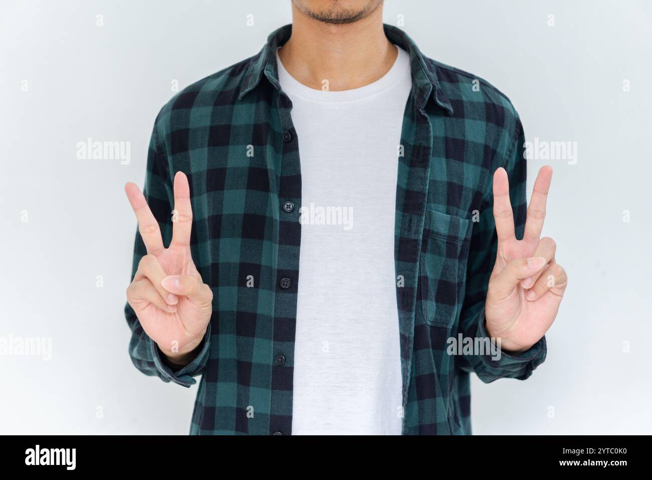 Half cropped body Young Adult men with flannel and white shirt peace v ...
