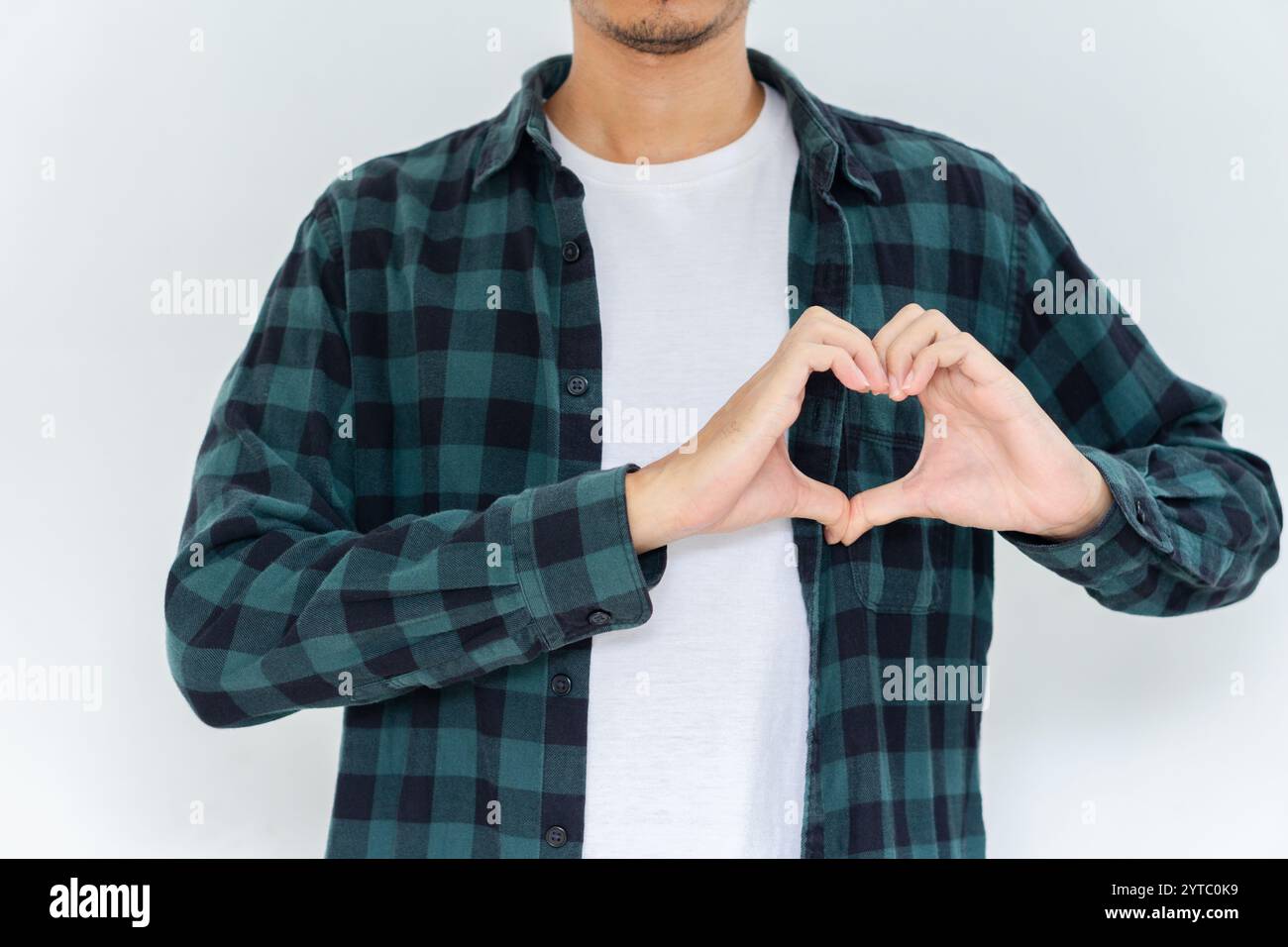 Half cropped body Young Adult men with flannel and white shirt making ...