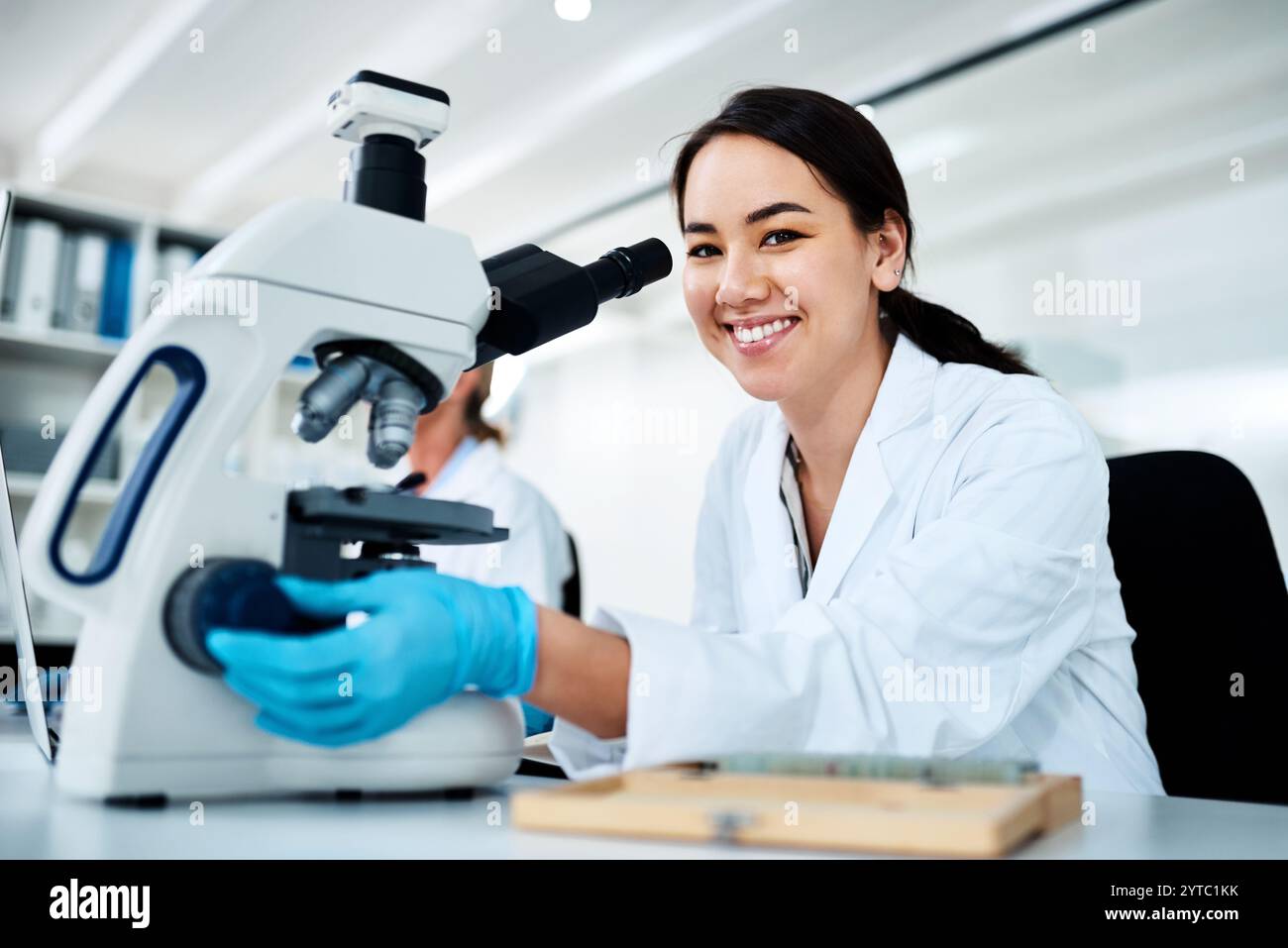 Happy woman, portrait and forensic scientist with microscope at lab for ...