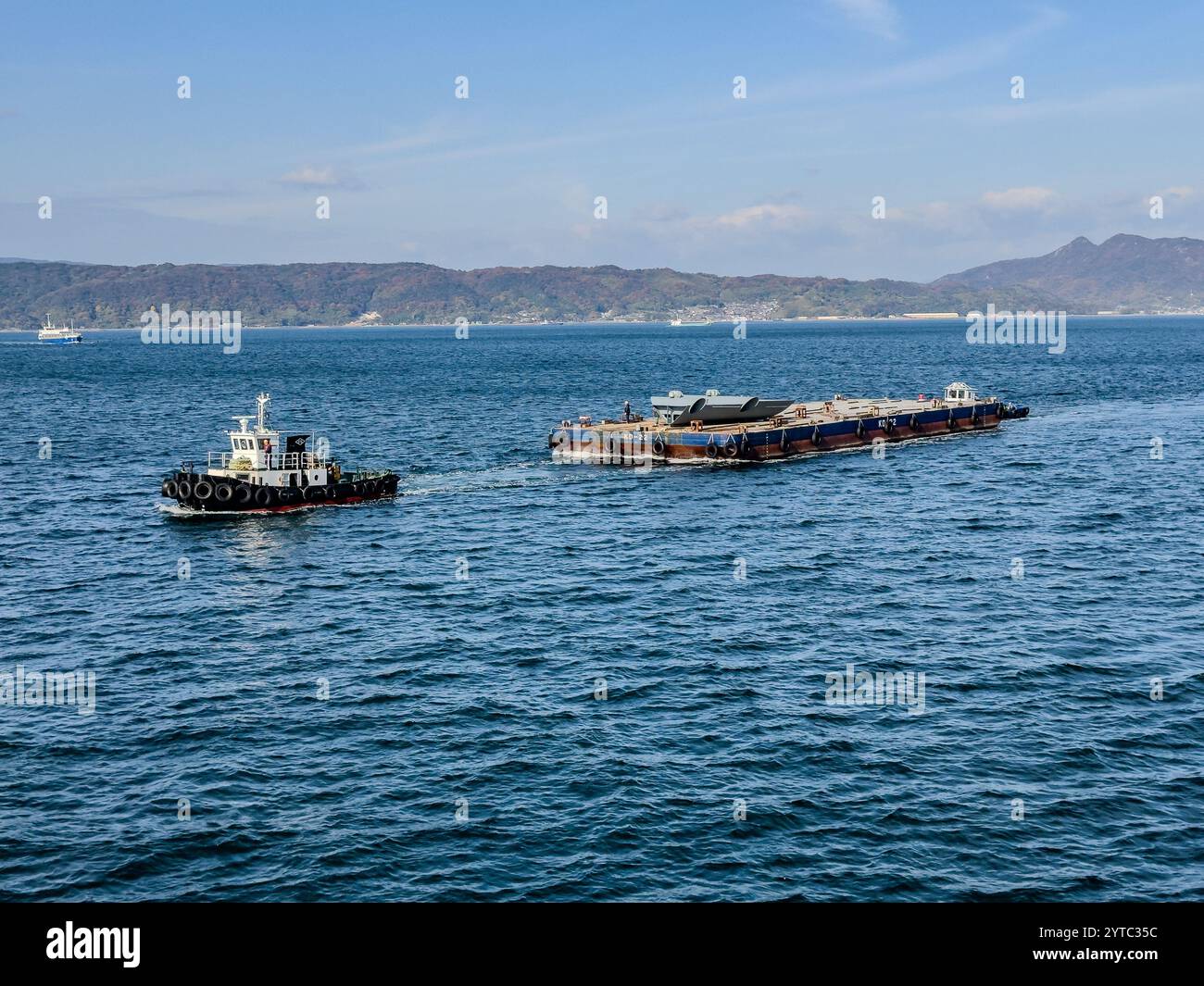 Tug boat in operation Stock Photo - Alamy