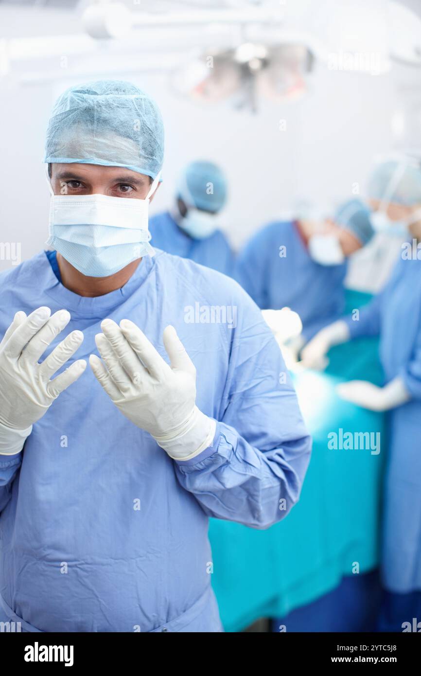 Doctors, surgery and teamwork with man in hospital for healthcare ...