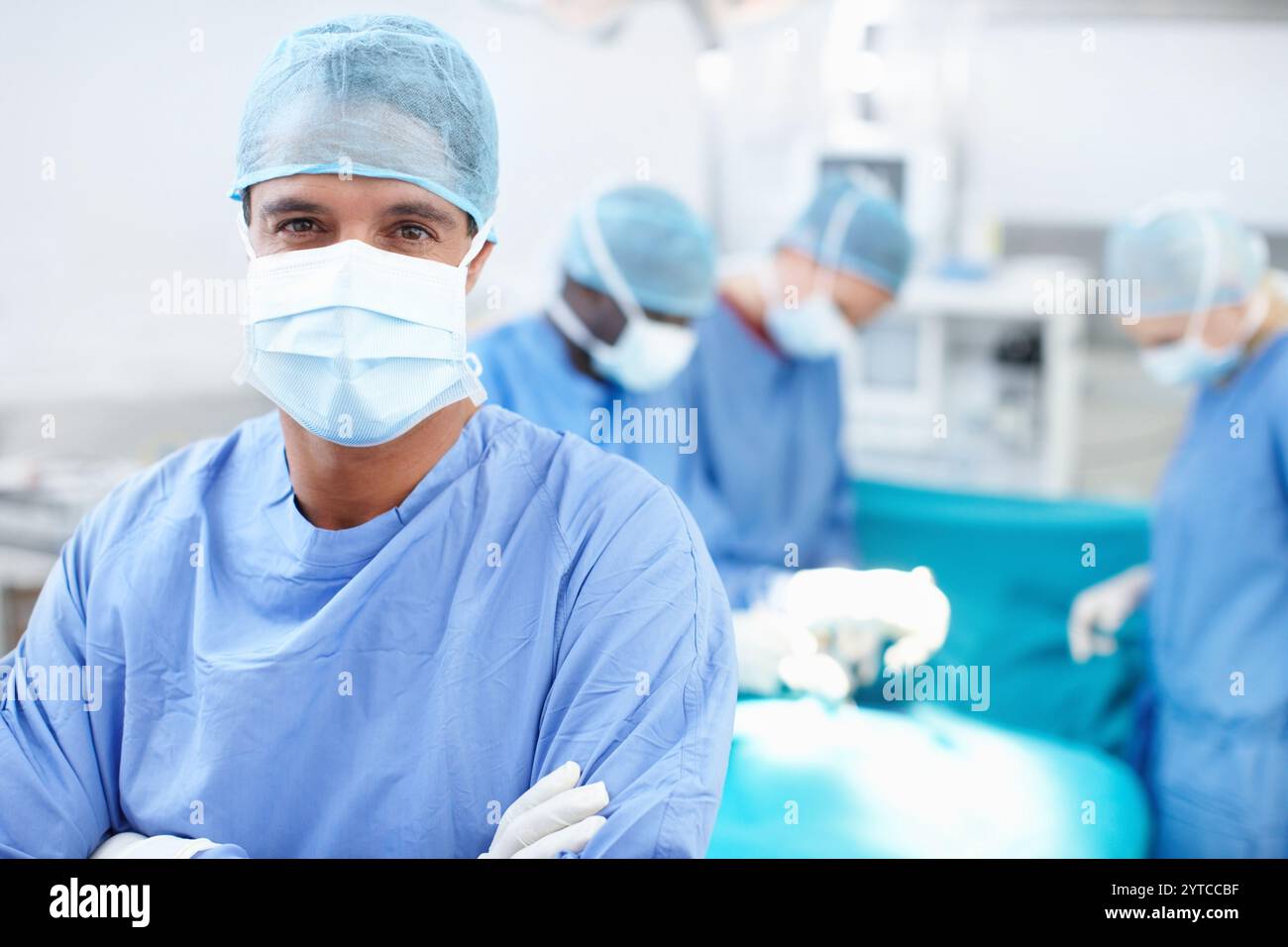 Theatre, man and doctor in portrait with arms crossed, medical surgery ...