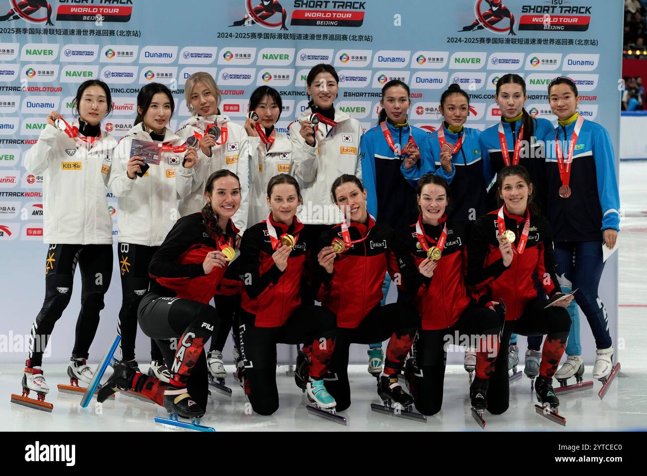 Canada's gold medal team, foreground, South Korea's silver medal team, left, and Kazakhstan's ...