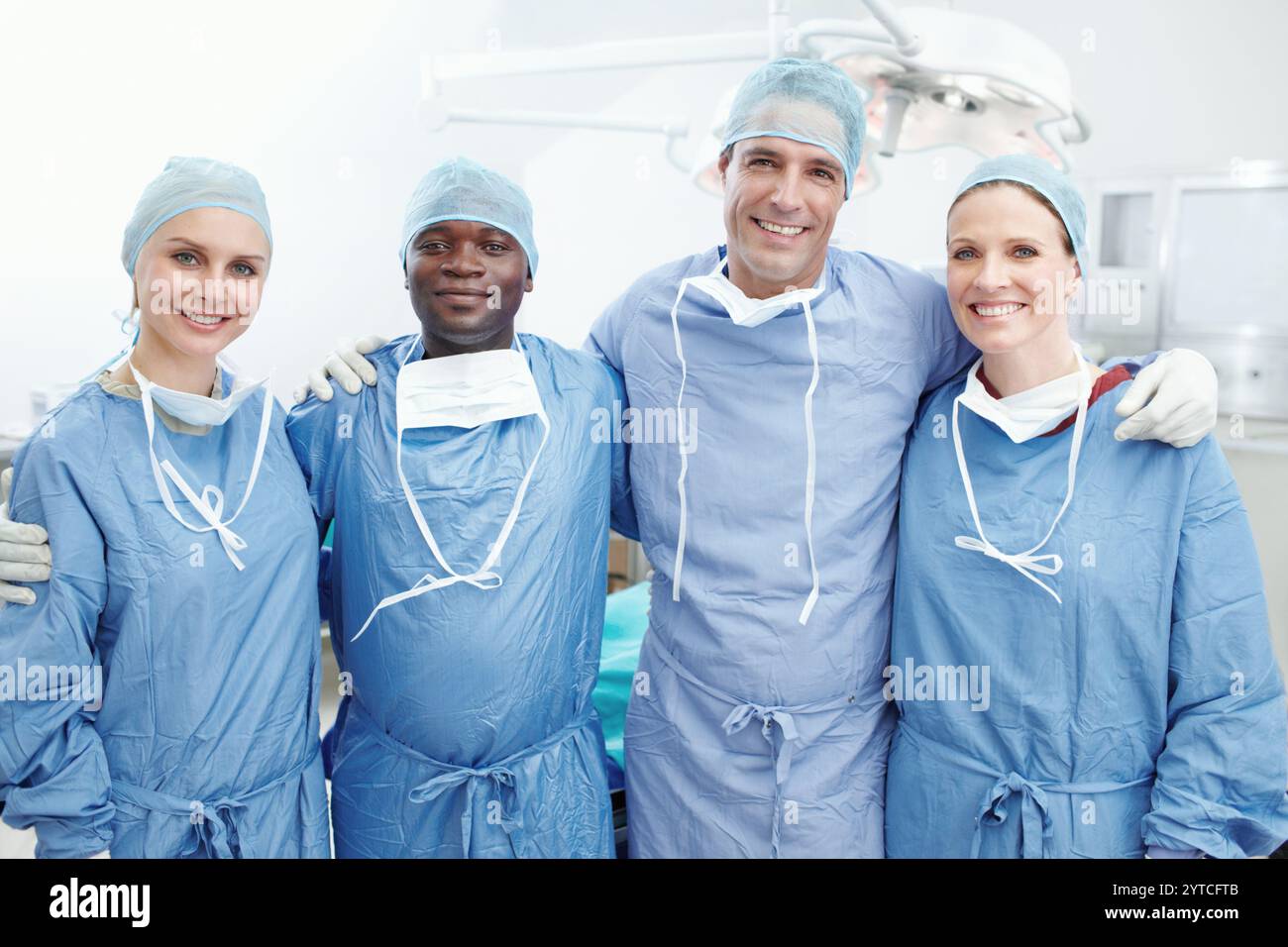 Doctors, support and hug in portrait for theater, medical surgery and ...