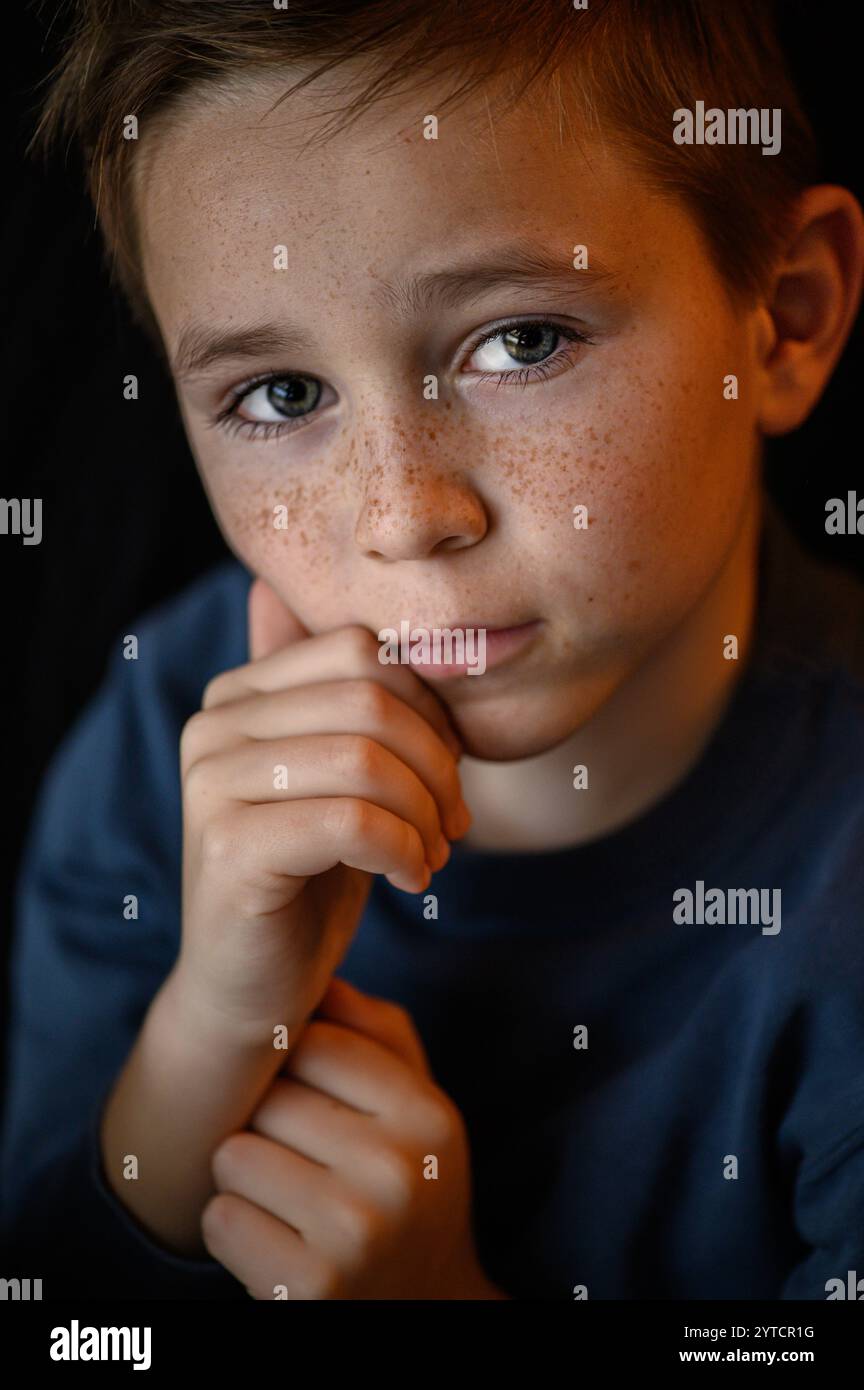 close-up portrait boy with freckles on the cheeks with blue eyes Stock ...