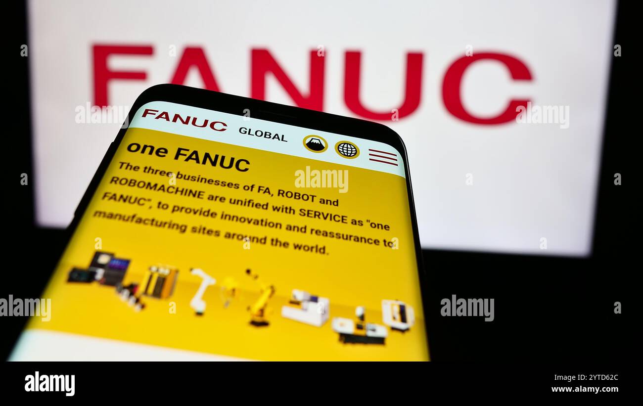 In this photo illustration, a mobile phone with the website of Japanese ...