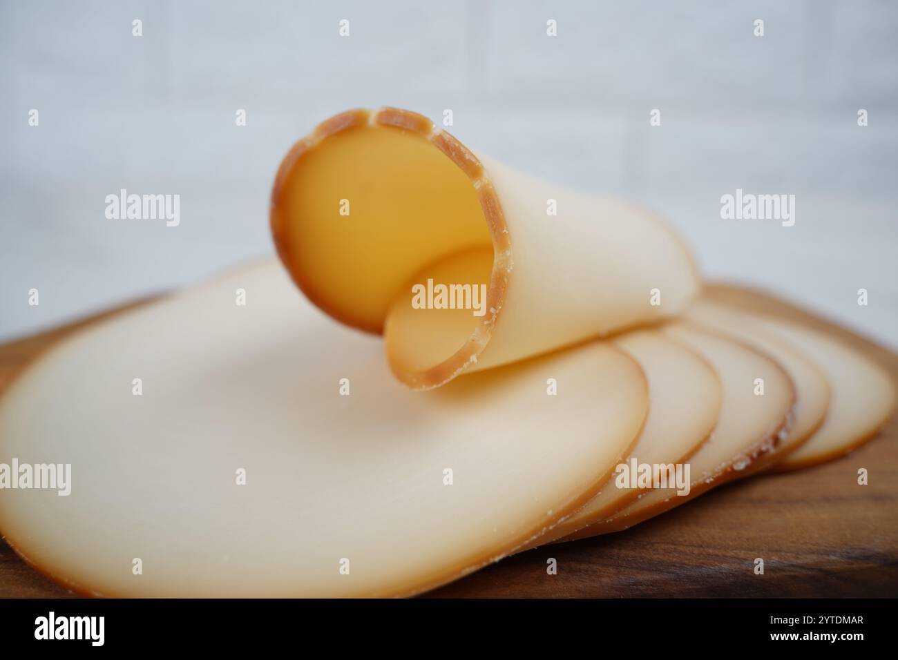 Smoked cheese. Dutch sliced cheese Stock Photo - Alamy