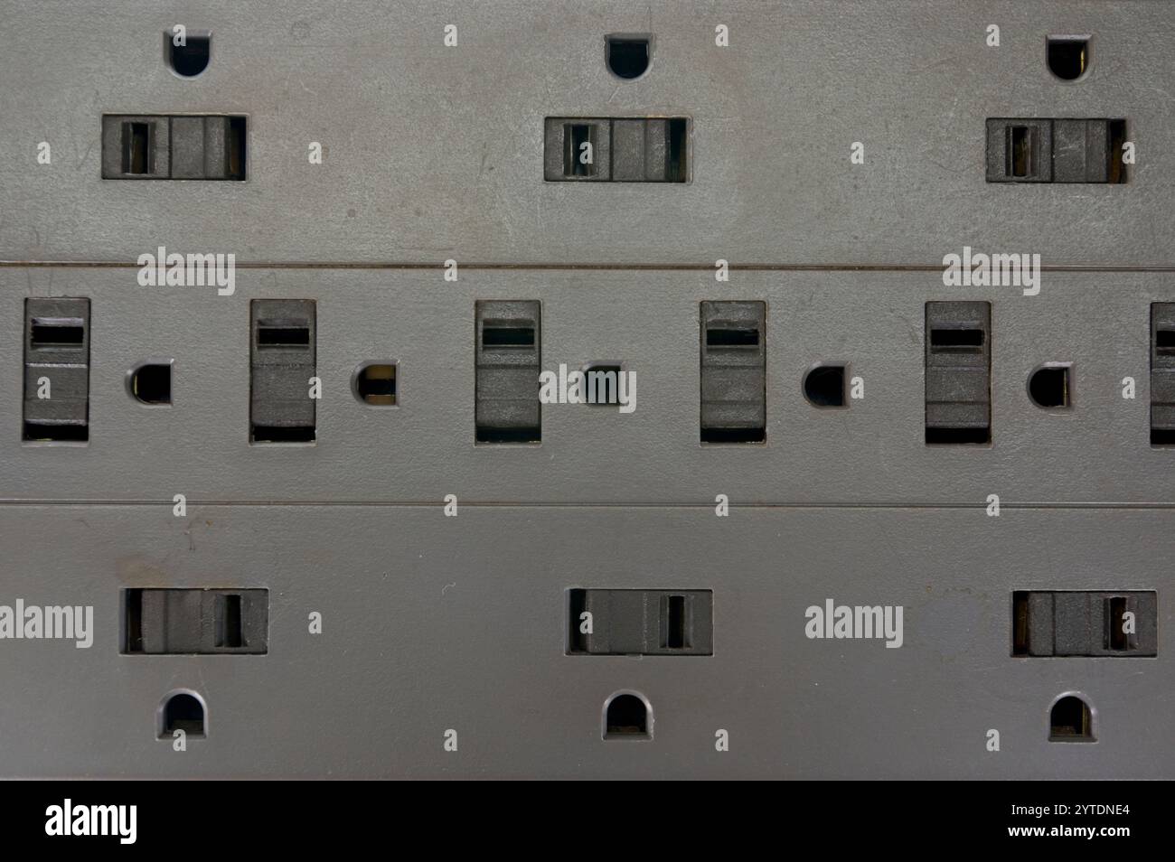 Power strip outlets in a close up Stock Photo - Alamy
