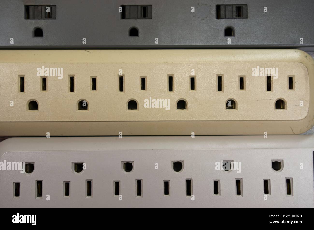 Old power strips lined up top to bottom Stock Photo - Alamy