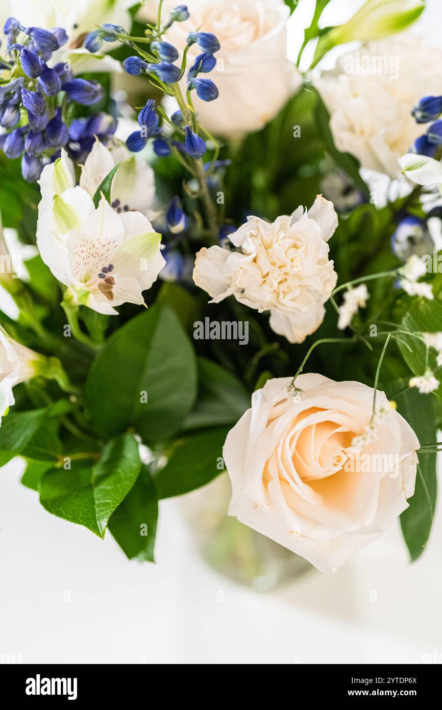 Elegant White Rose Bouquet Adorns a Beautiful Vase Stock Photo - Alamy
