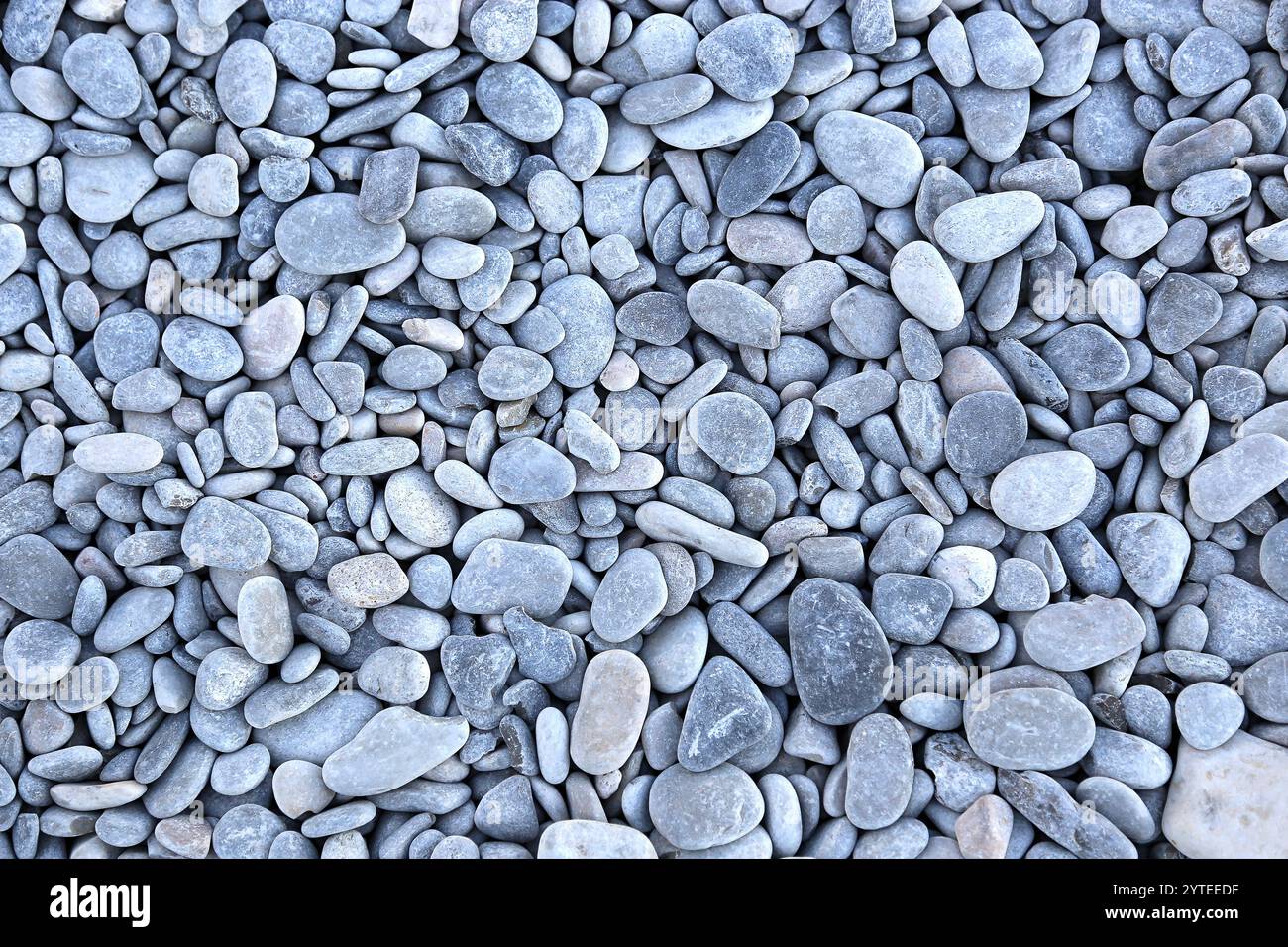 Nature background from gray sea pebbles Stock Photo - Alamy