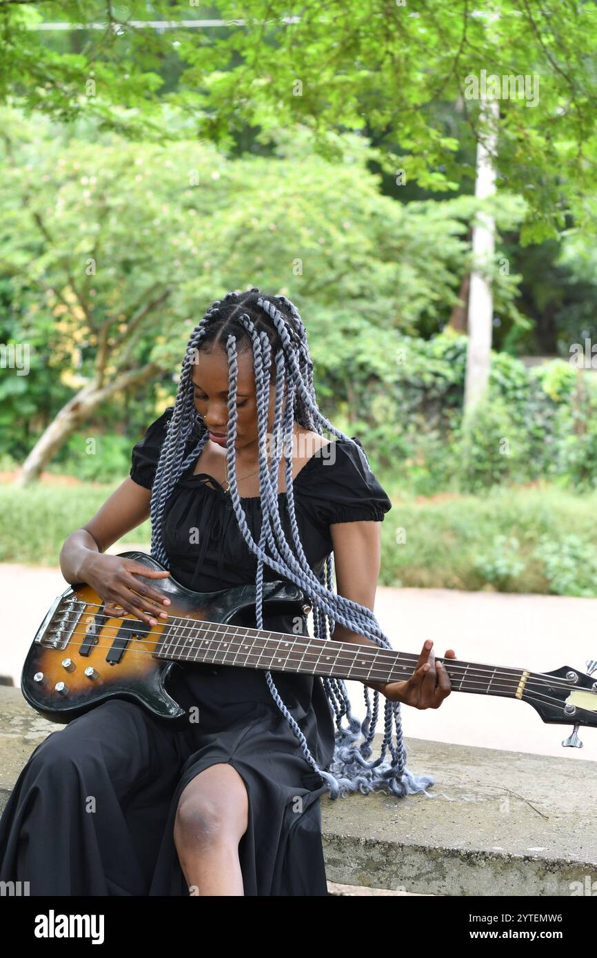 Guitar string woman hand outdoor hi-res stock photography and images ...