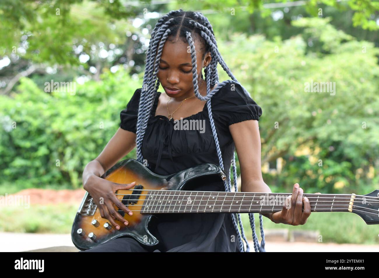 Guitar string woman hand outdoor hi-res stock photography and images ...