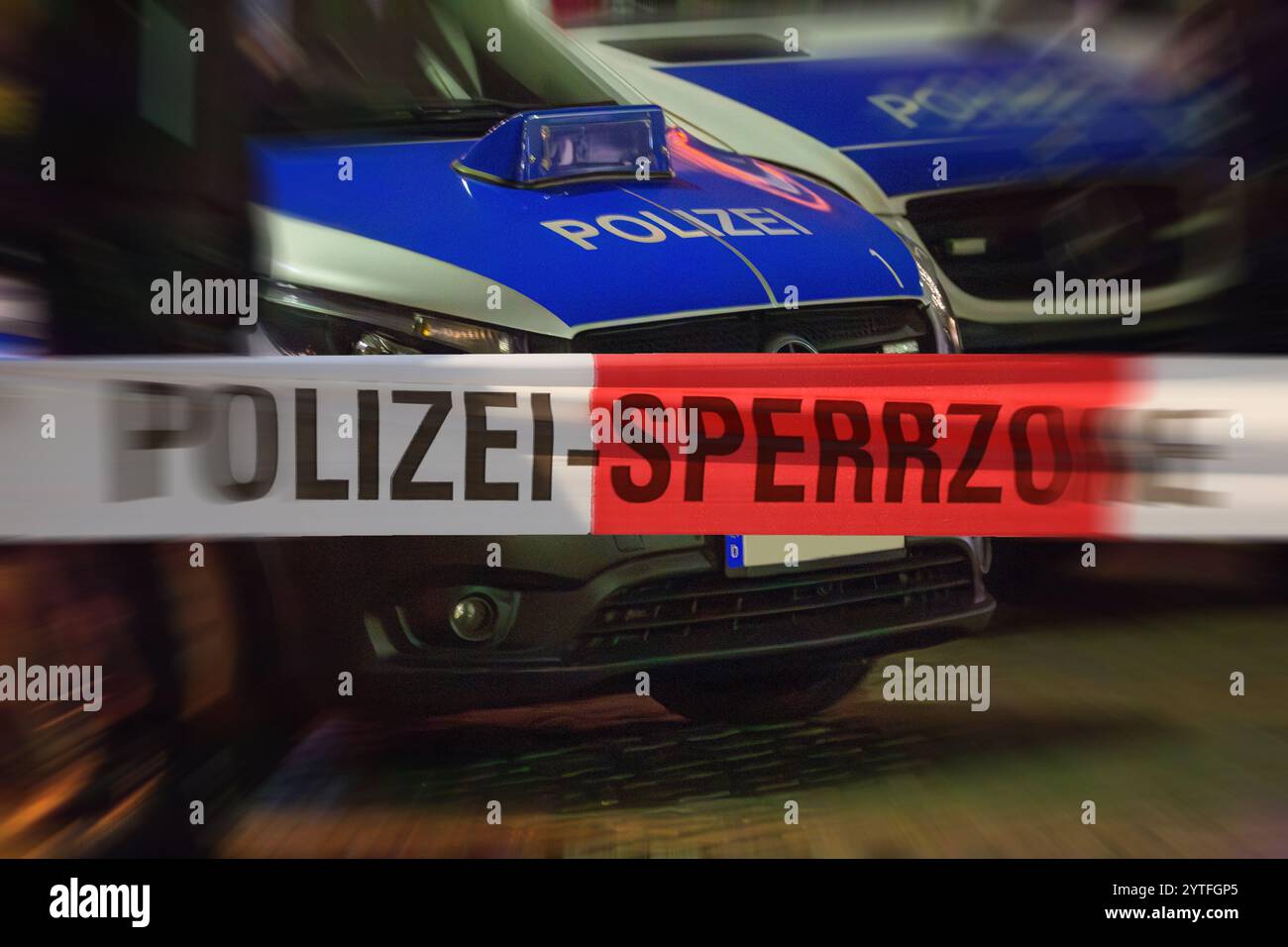 Symbol image police operation: Police patrol cars behind a barrier tape ...