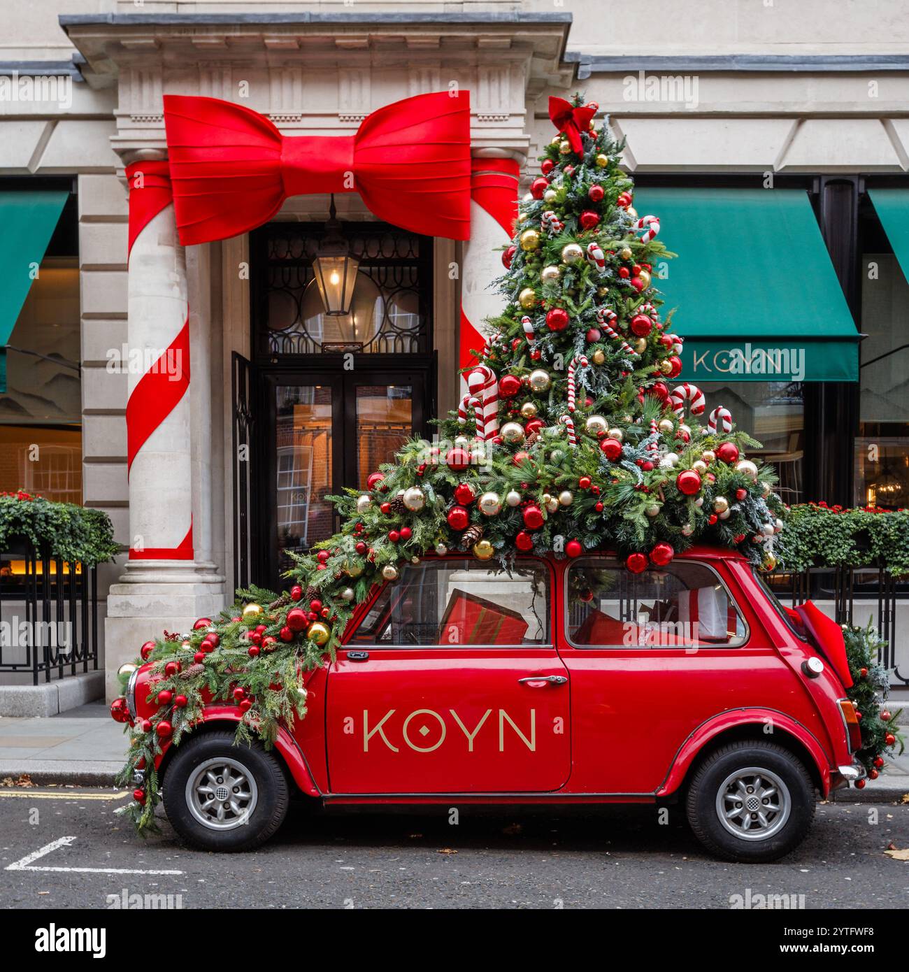 The famous little red car outside KOYN restaurant in Mayfair, London ...