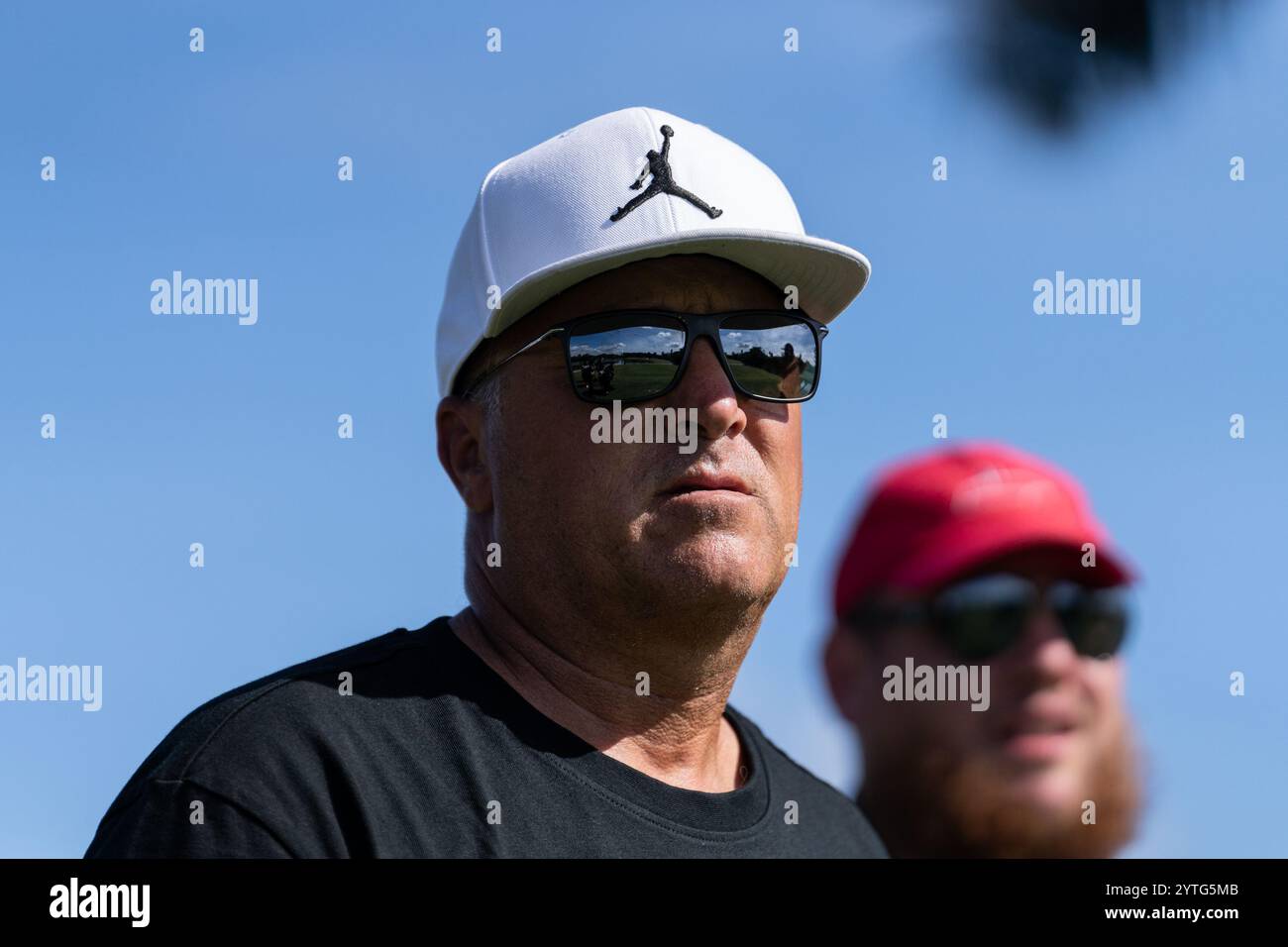 Eric Dantes and Luke Combs looking down the fairway during the 2nd ...